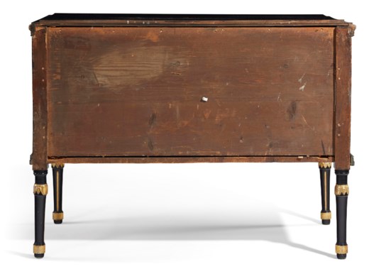 A NORTHERN EUROPEAN EBONIZED AND PARCEL-GILT DOUBLE DOOR COMMODE ...