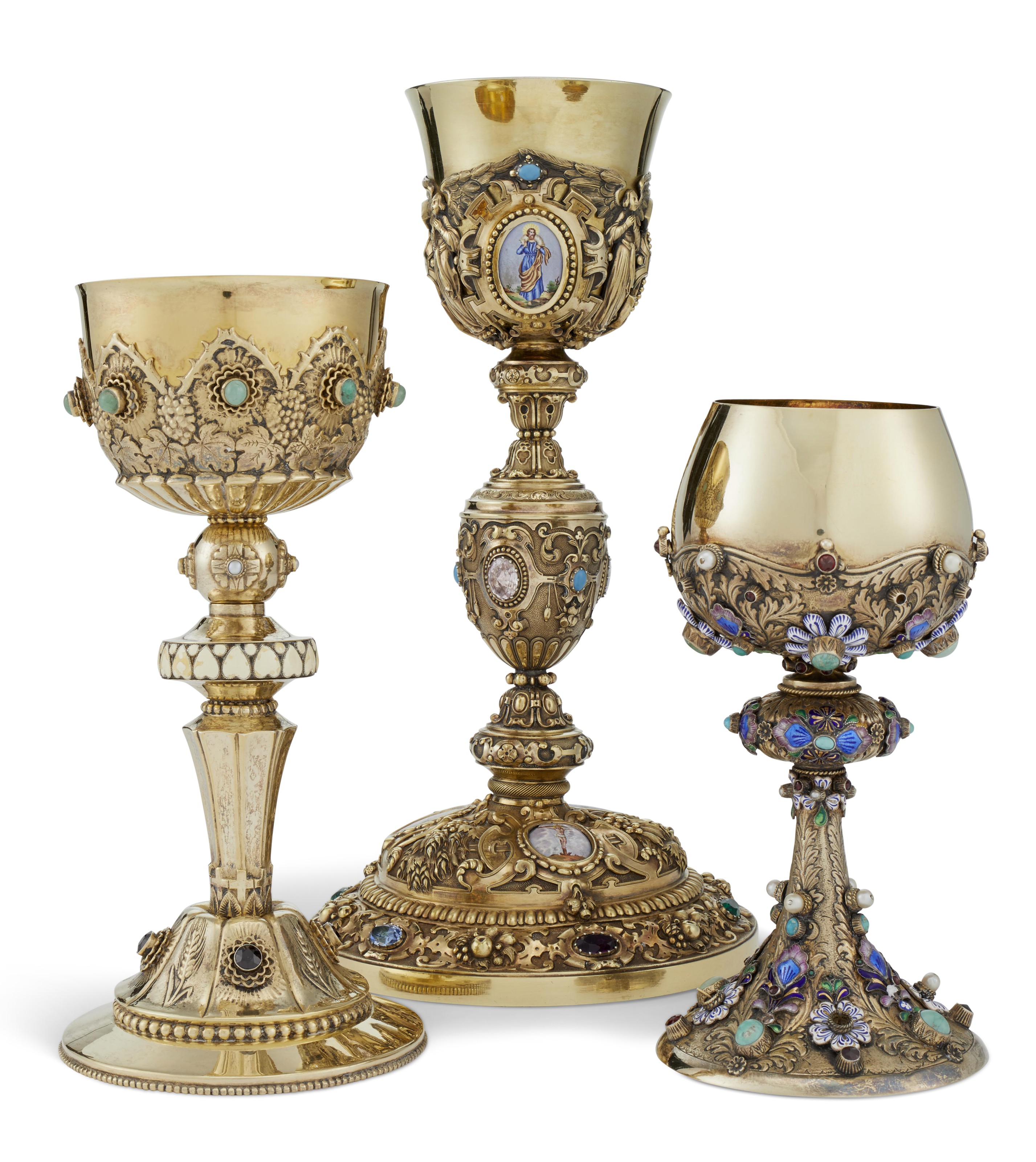 THREE CONTINENTAL SILVER-GILT, ENAMEL AND GEM-SET CHALICES, VARIOUS ...