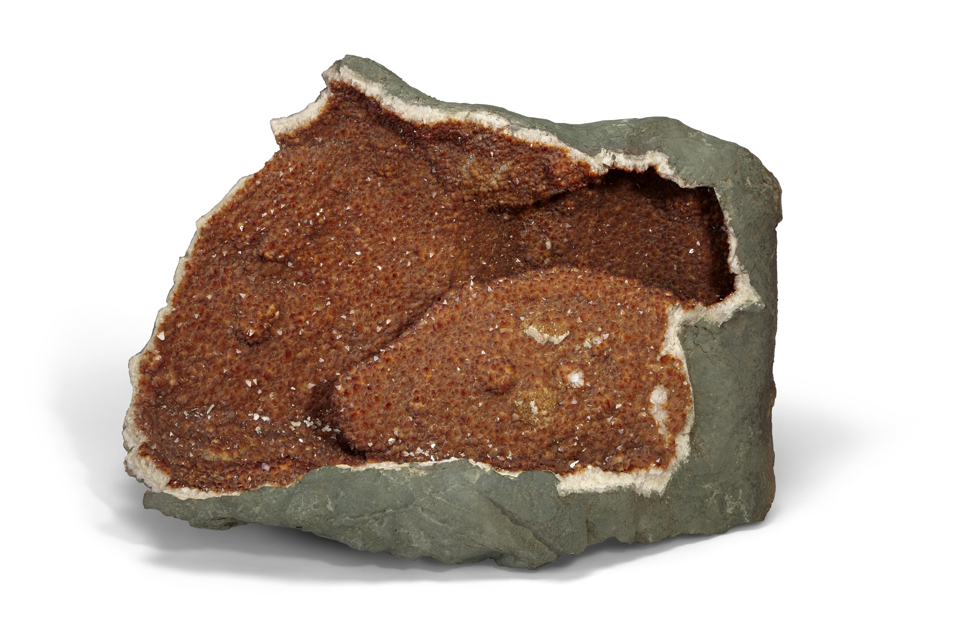 A LARGE AMBER-COLORED GEODE, RECENTLY EXCAVATED | Christie’s