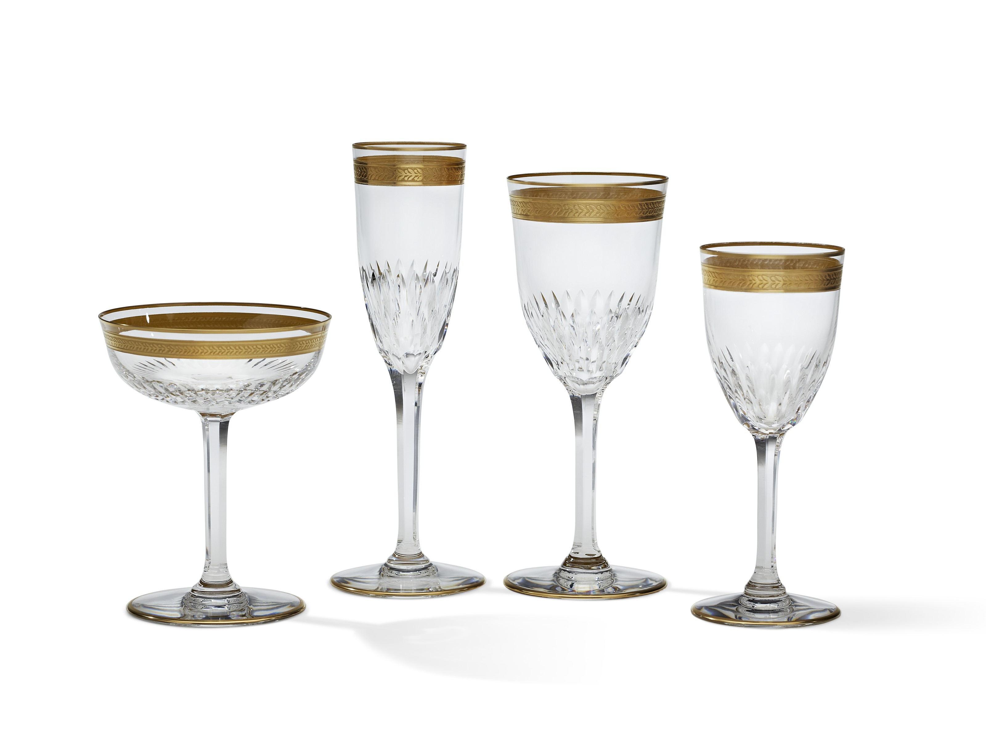 A FRENCH GILT DECORATED CLEAR CUT GLASS STEMWARE SERVICE, ACID STAMP ...