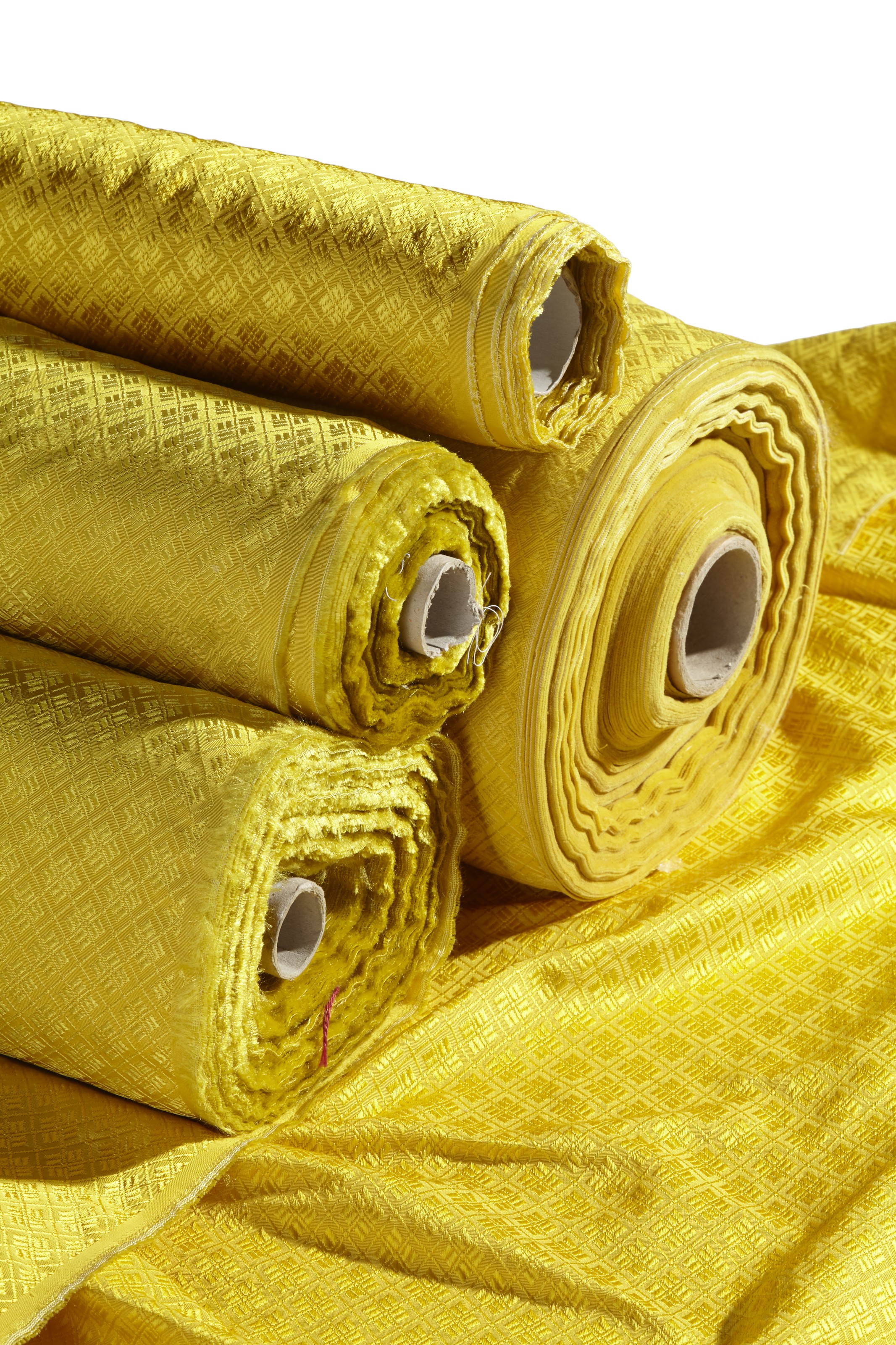 FOUR PARTIAL BOLTS OF YELLOW SILK DAMASK WOVEN IN A GEOMETRIC PATTERN ...