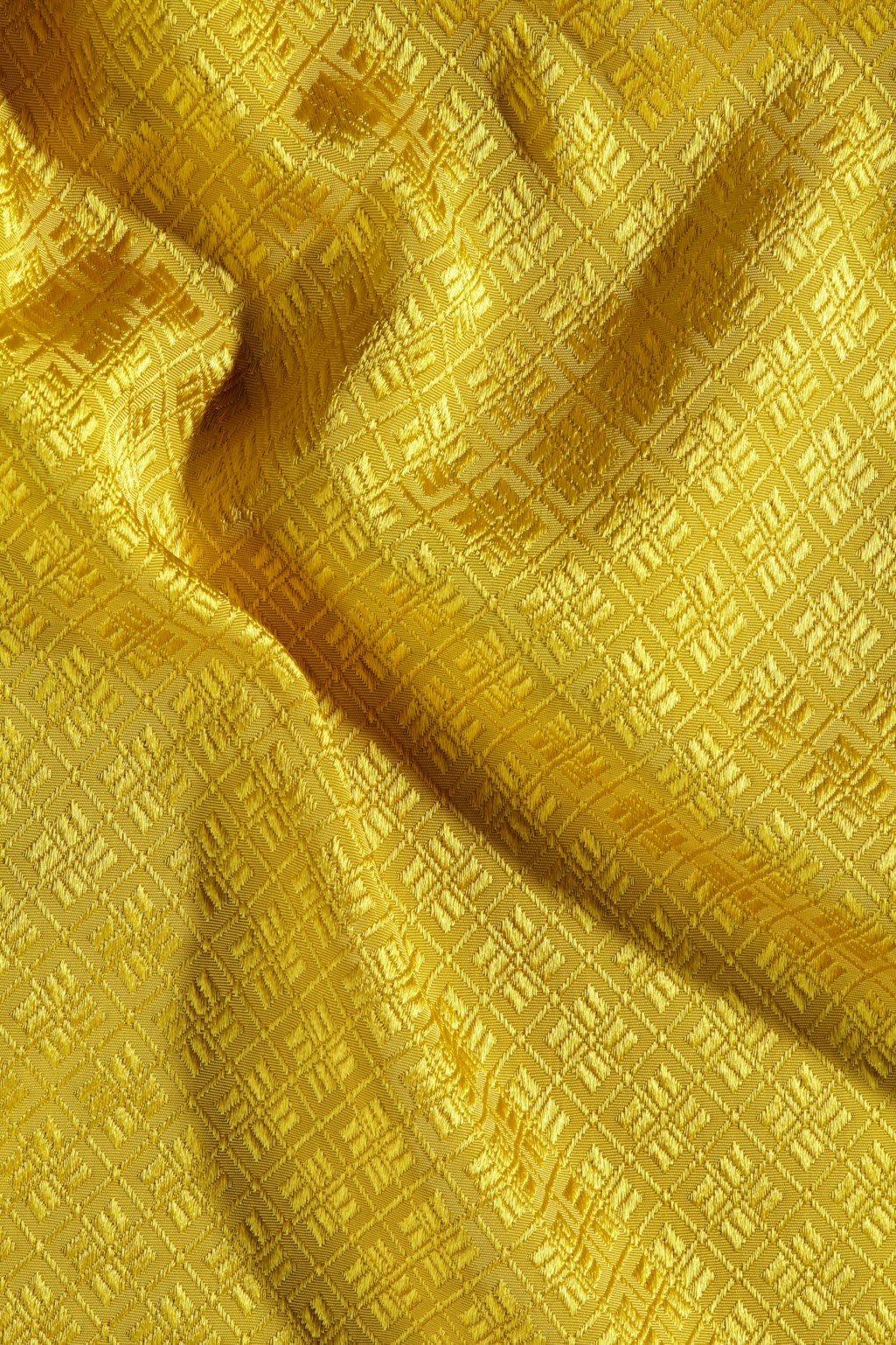 FOUR PARTIAL BOLTS OF YELLOW SILK DAMASK WOVEN IN A GEOMETRIC PATTERN ...