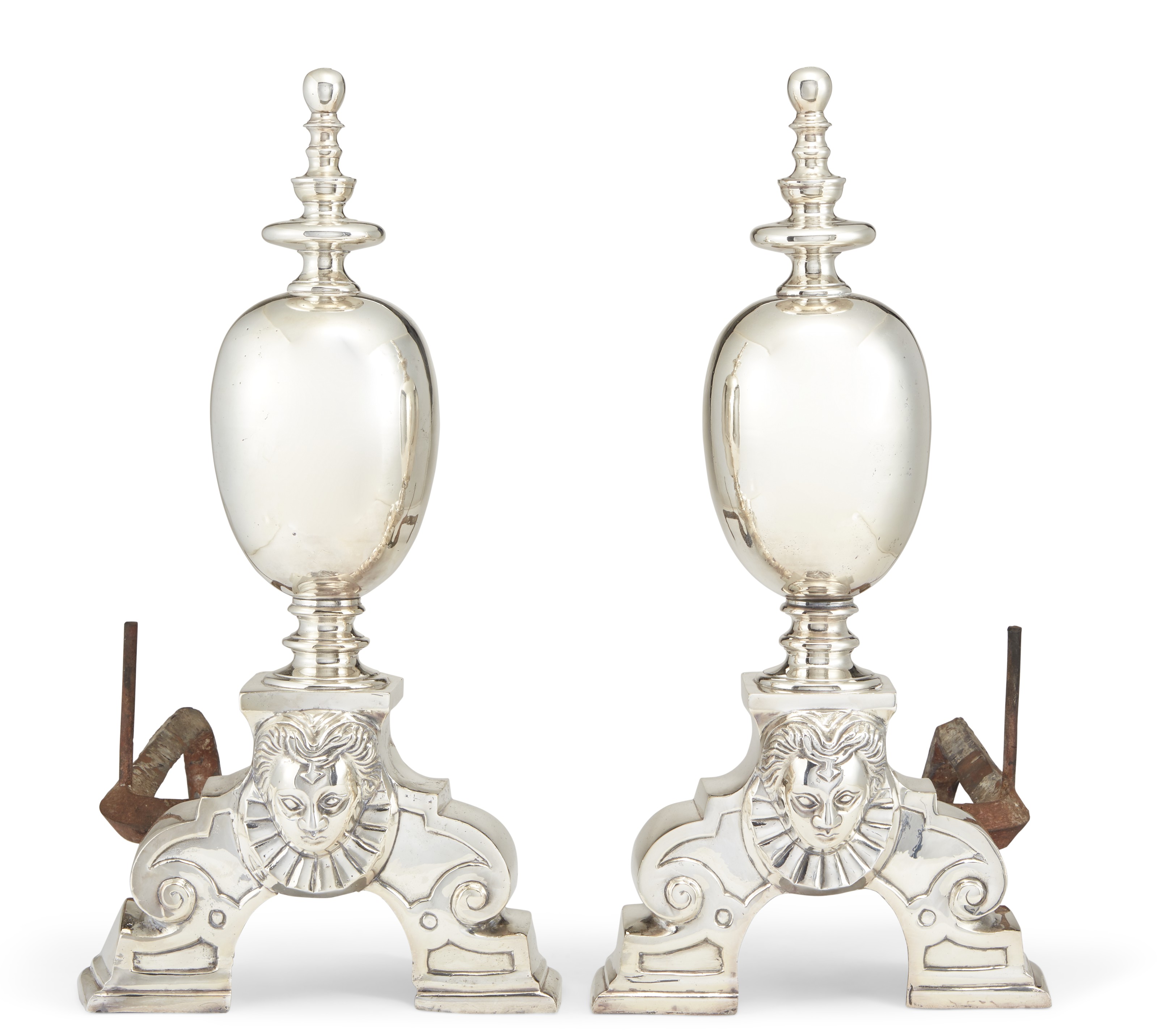 A PAIR OF BAROQUE STYLE SILVERED ANDIRONS, POSSIBLY NORTH EUROPEAN ...