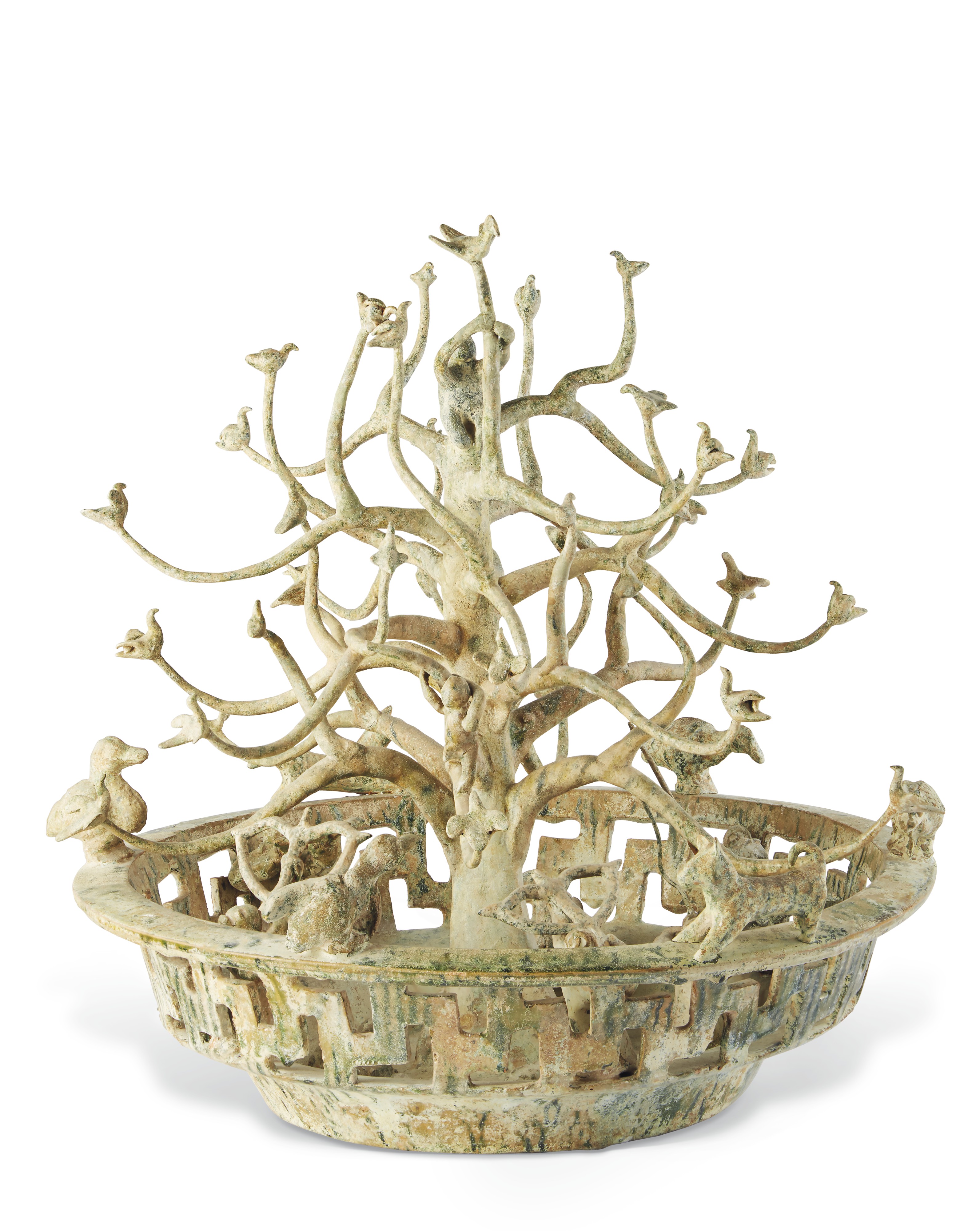 A CHINESE GREEN-GLAZED POTTERY MODEL OF TREE, HAN DYNASTY (206 BC - 220 ...