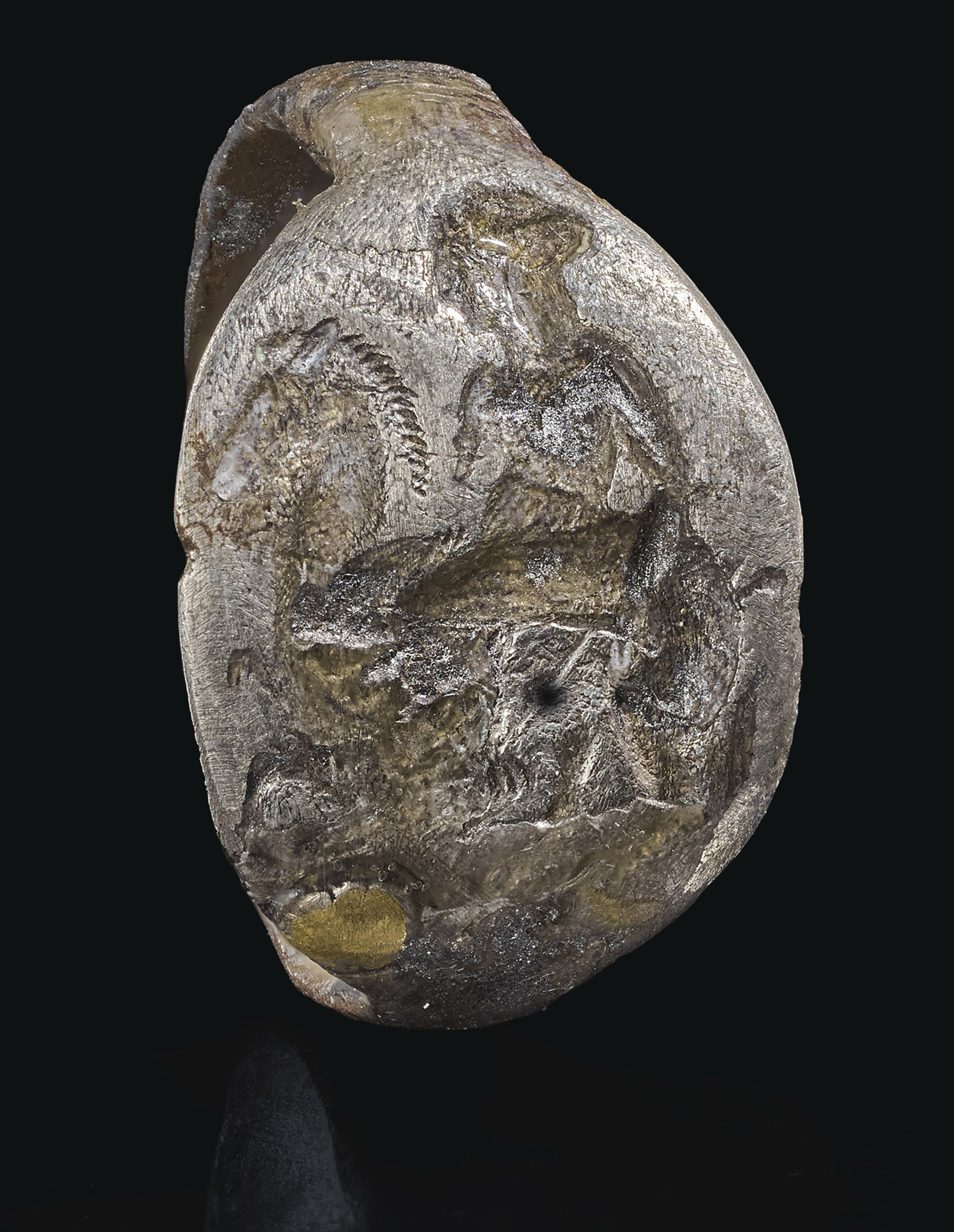 A GREEK SILVER FINGER RING WITH A WOMAN ON A HORSE, CIRCA MID 4TH ...