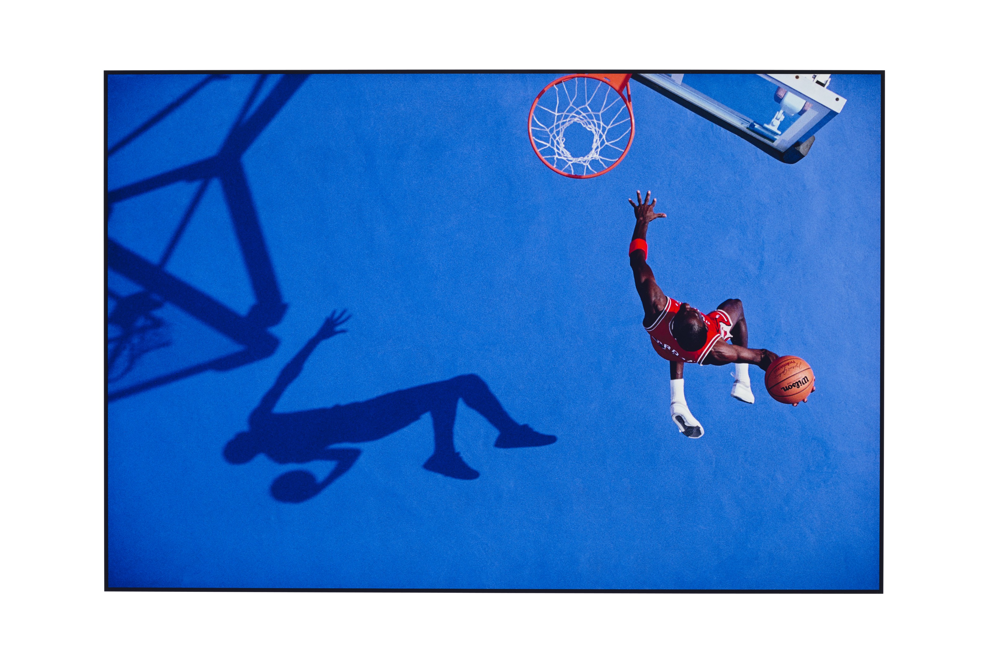 WALTER IOOSS JR. (B.1943), Michael Jordan, ‘The Blue Dunk’, Lisle, IL ...