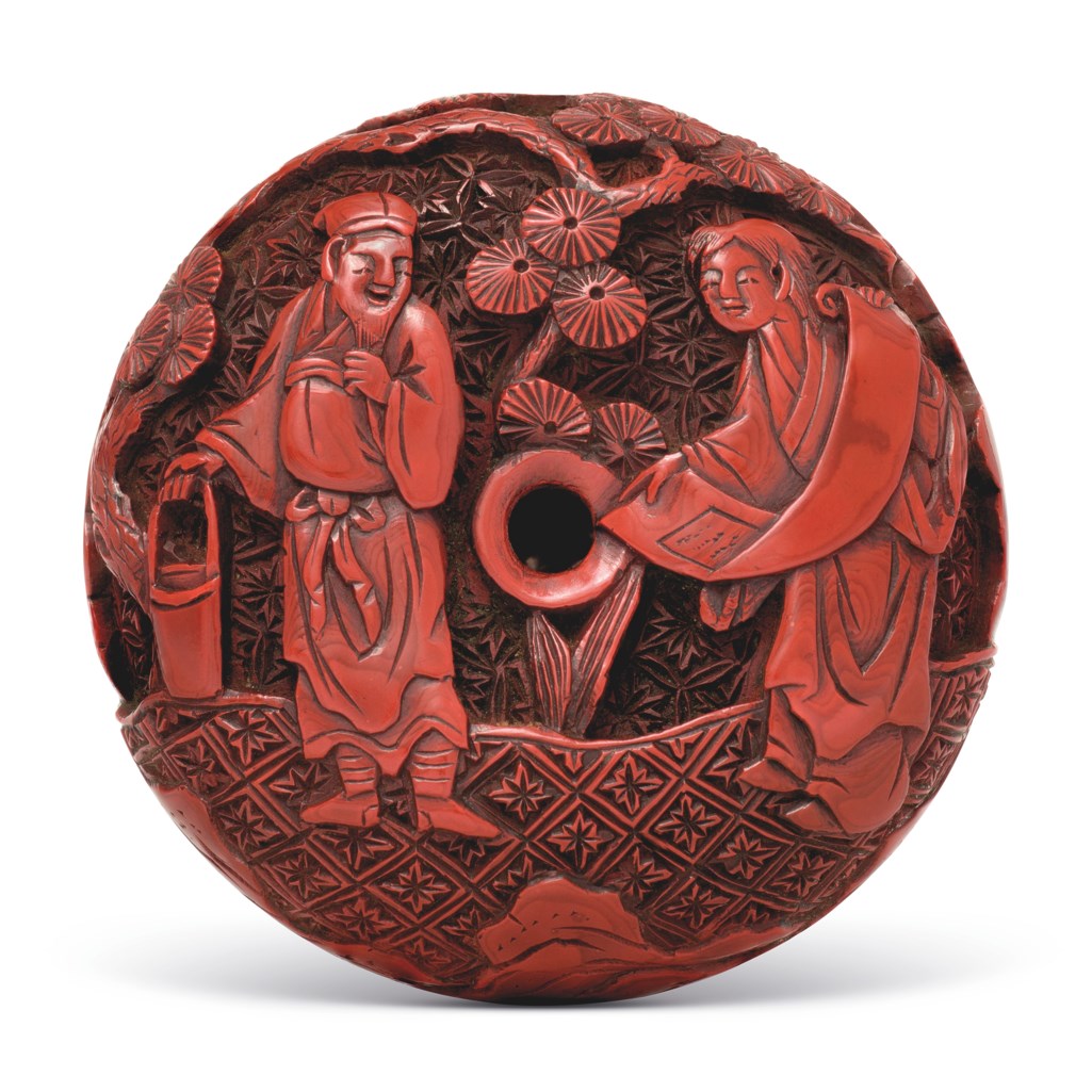 A CARVED RED LACQUER (TSUISHU) AND METALWORK KAGAMIBUTA NETSUKE, EDO ...