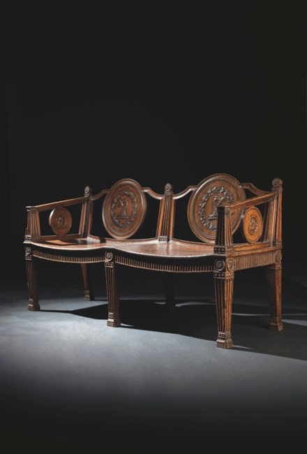 A GEORGE III WALNUT HALL BENCH