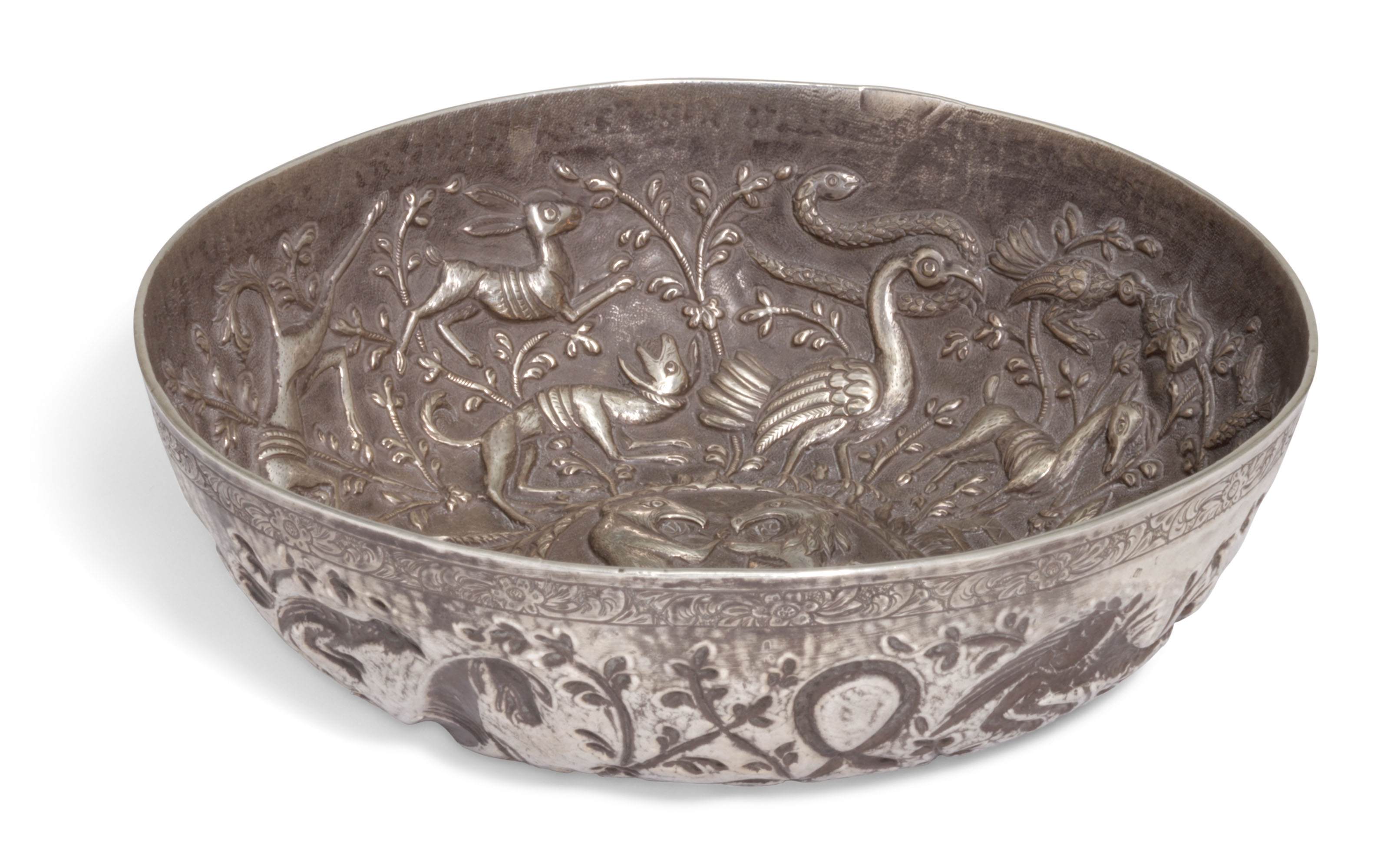 A SILVER REPOUSSÉ BOWL