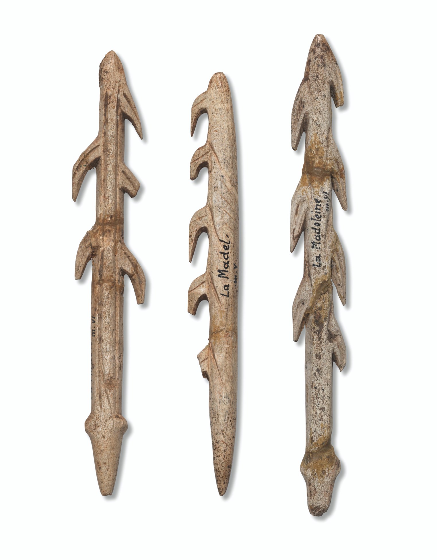 THREE MAGDALENIAN BONE BARBED HARPOONS, UPPER PALEOLITHIC PERIOD, CIRCA ...