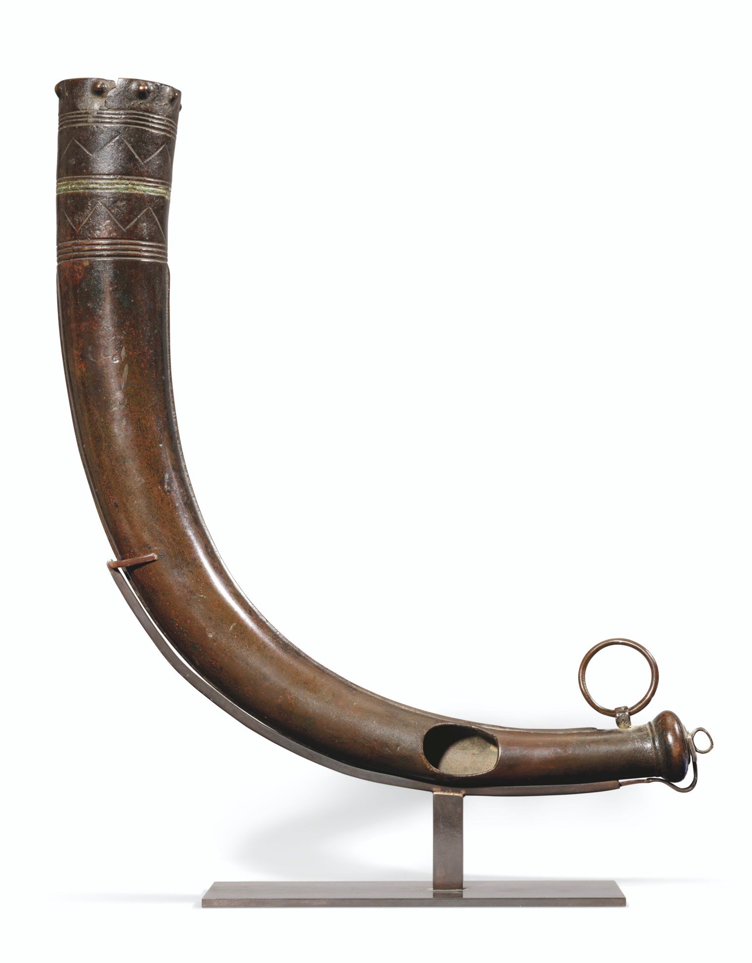AN IRISH BRONZE SIDE-BLOW HORN, LATE BRONZE AGE, CIRCA 8TH-7TH CENTURY ...