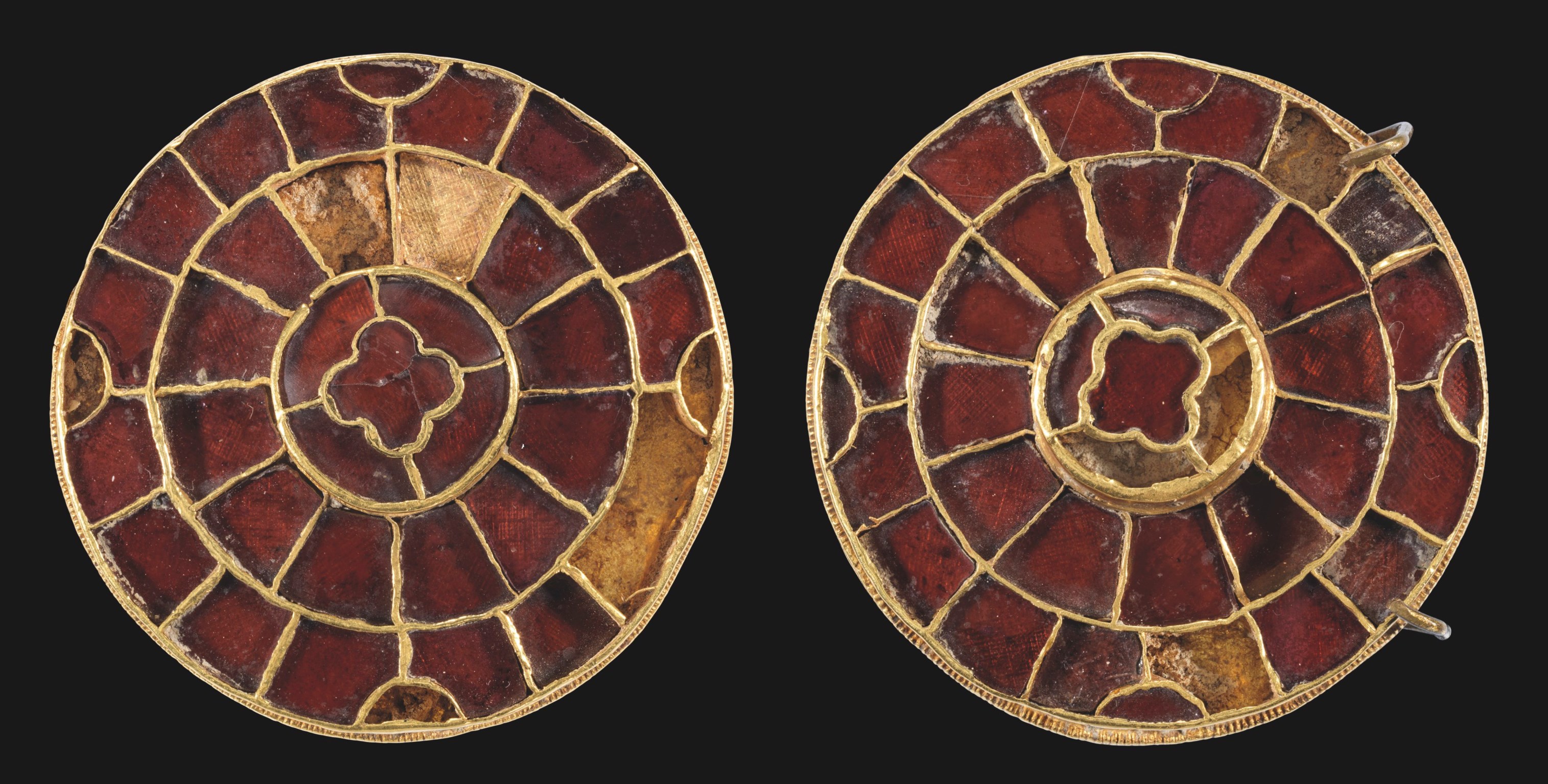 A PAIR OF MEROVINGIAN GOLD AND GARNET DISC BROOCHES, CIRCA 6TH CENTURY ...