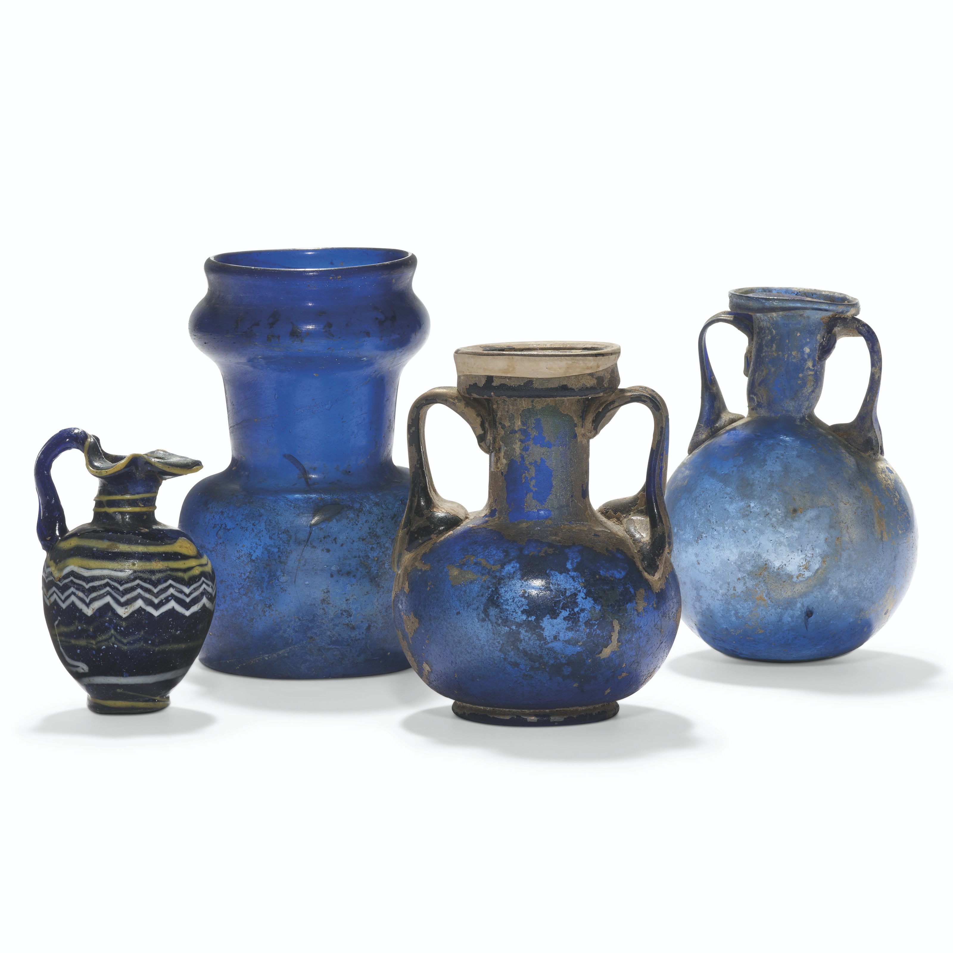 AN EGYPTIAN CORE-FORMED GLASS AMPHORISKOS, NEW KINGDOM, 19TH DYNASTY ...