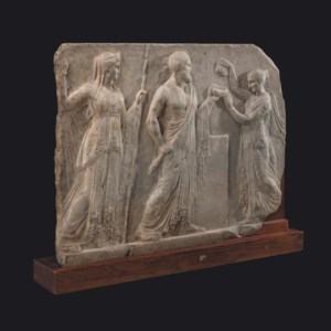 A ROMAN MARBLE ARCHAISTIC RELIEF PANEL, NEO-ATTIC, CIRCA LATE 1ST ...