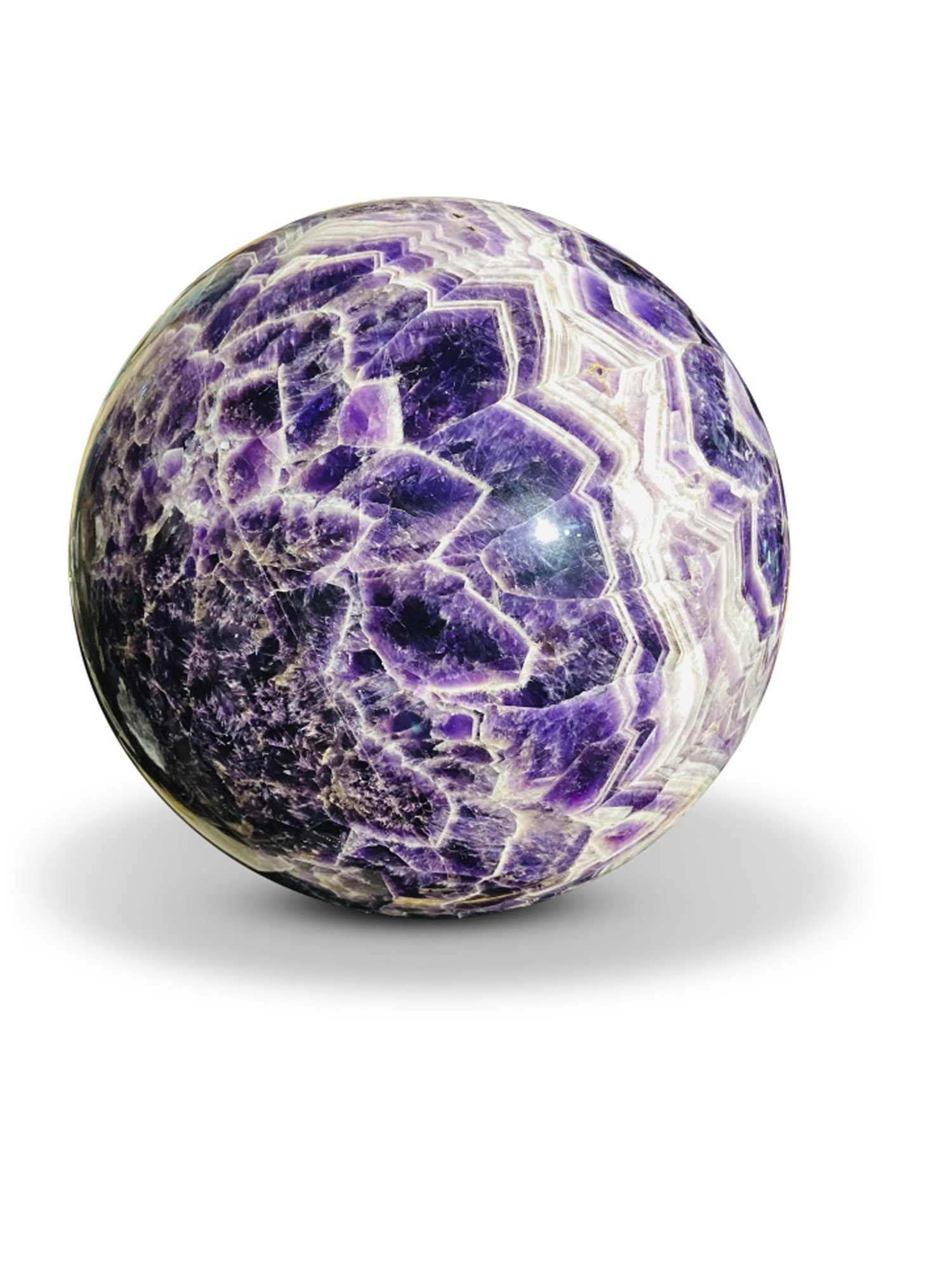 A VERY LARGE AMETHYST BANDED SPHERE WITH CHEVRONS, BRAZIL | Christie’s