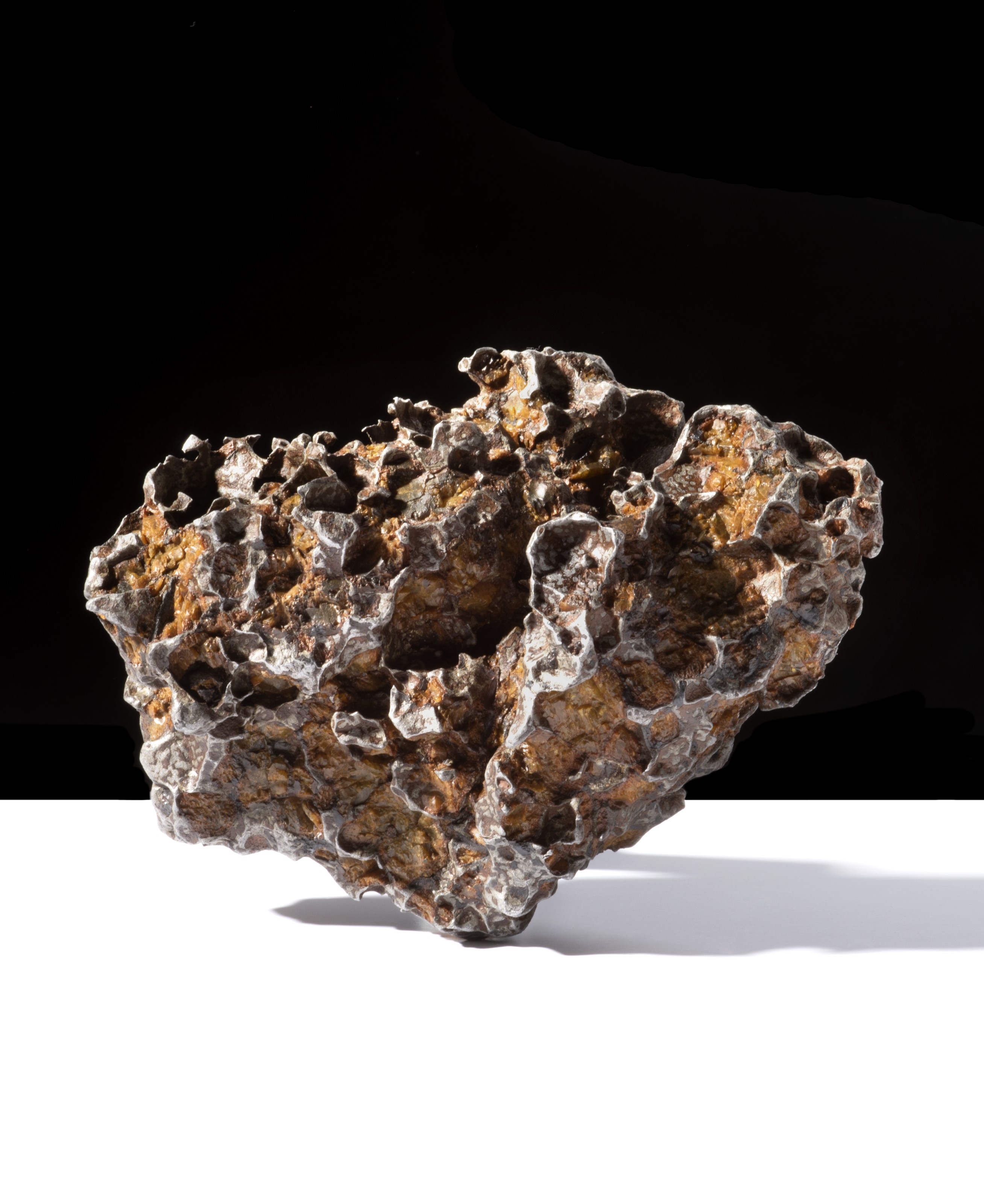 A SCULPTURAL NUGGET OF IMILAC, STONY IRON. PALLASITE (PAL) ATACAMA ...