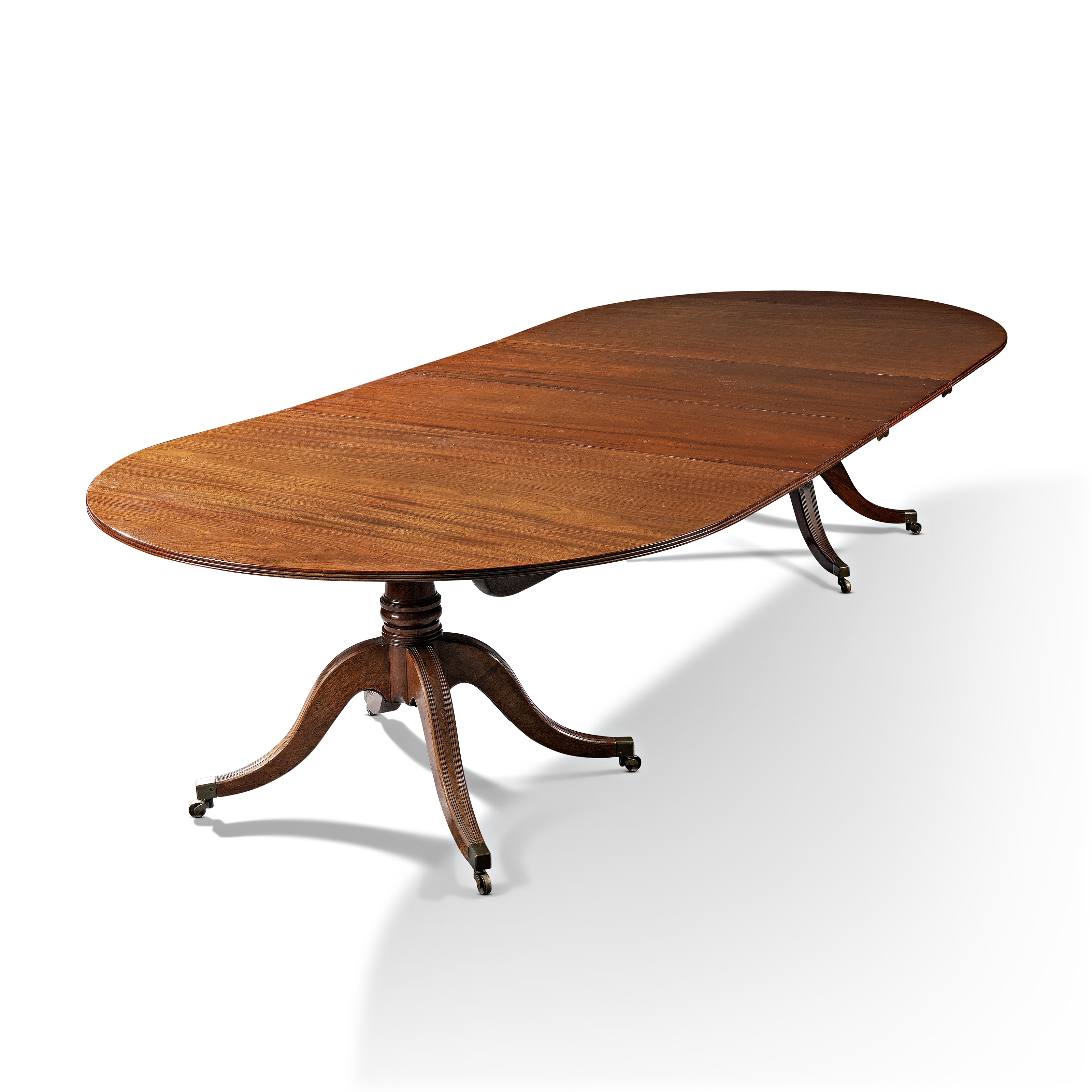 A GEORGE III MAHOGANY TWIN-PEDESTAL DINING-TABLE, CIRCA 1800 | Christie’s