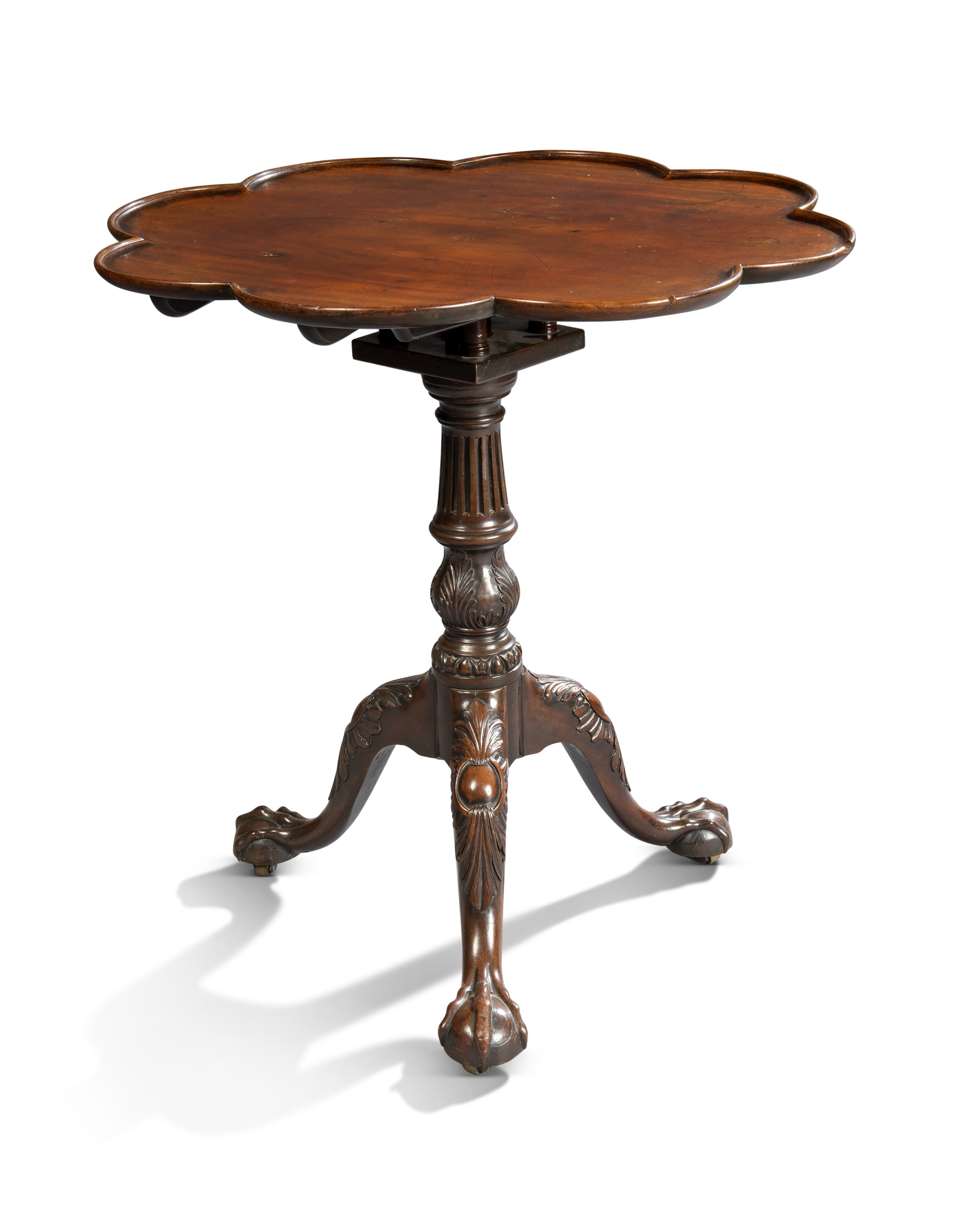 AN EARLY GEORGE II MAHOGANY LOBED CIRCULAR TILT-TOP TRIPOD TABLE, CIRCA ...