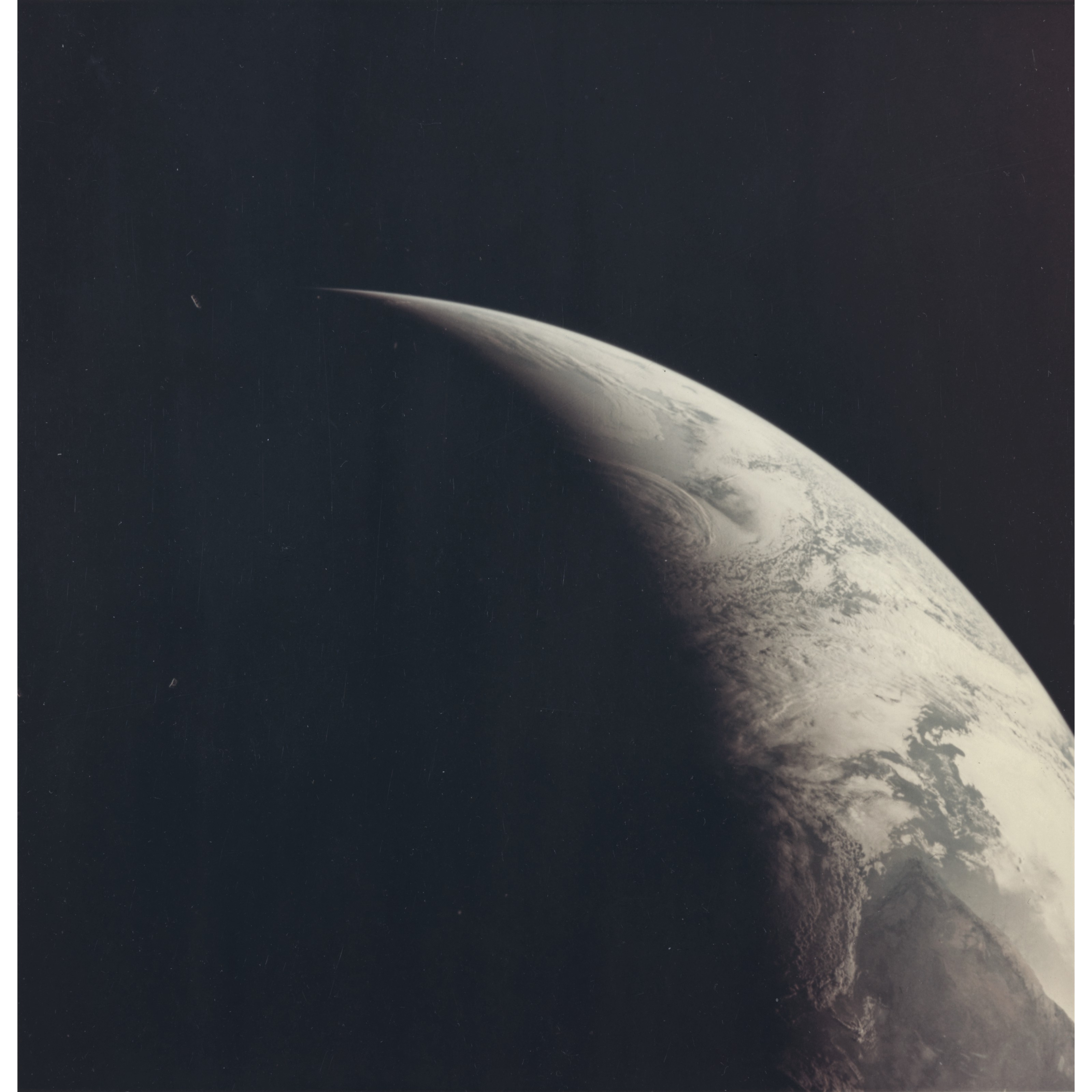 VIEW OF THE EARTH TERMINATOR ON THE WAY HOME, N. ARMSTRONG, B. ALDRIN ...