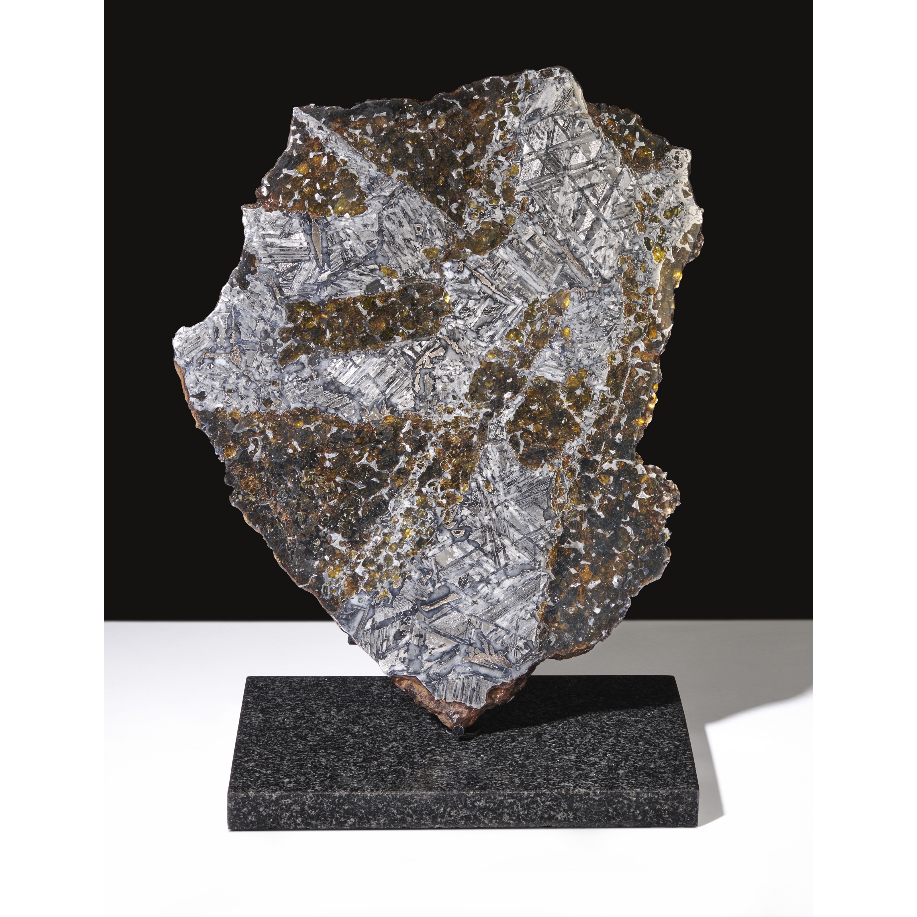 EXTRATERRESTRIAL GEMSTONES IN METALLIC MATRIX — A SEYMCHAN METEORITE ...