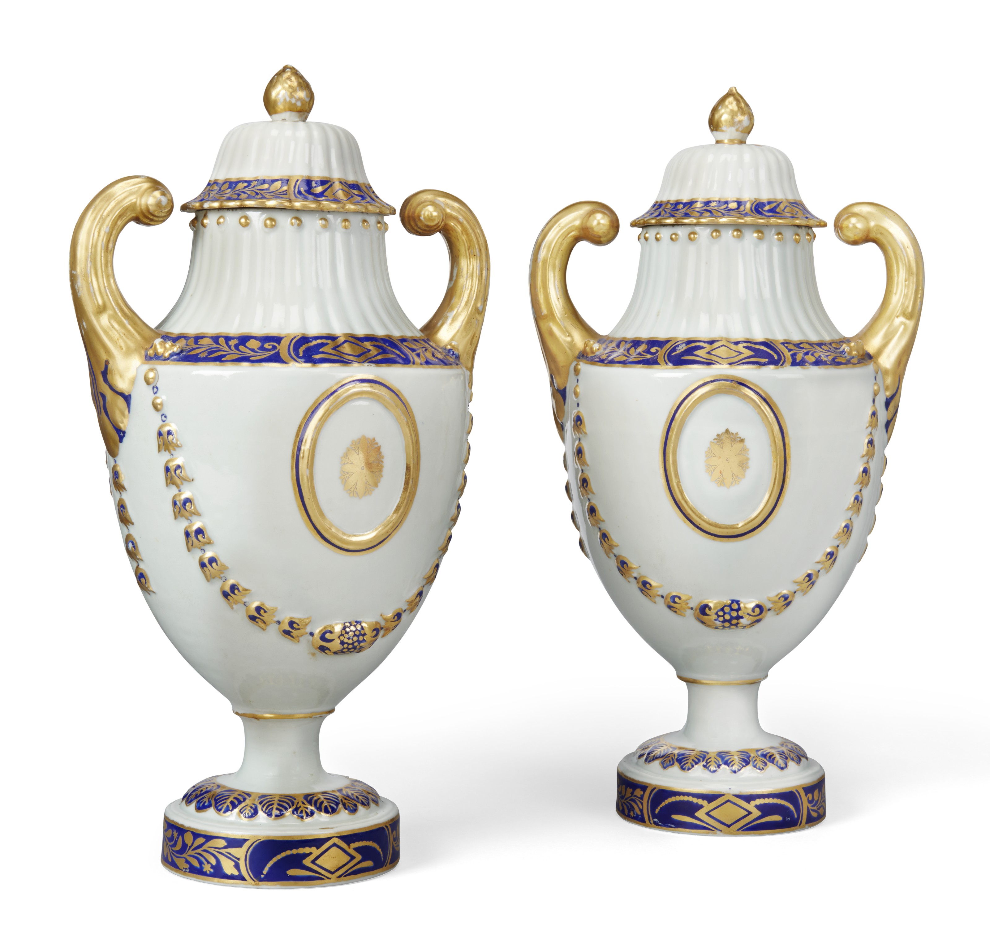 A PAIR OF CHINESE EXPORT PORCELAIN ‘PISTOL-HANDLED’ VASES AND COVERS ...