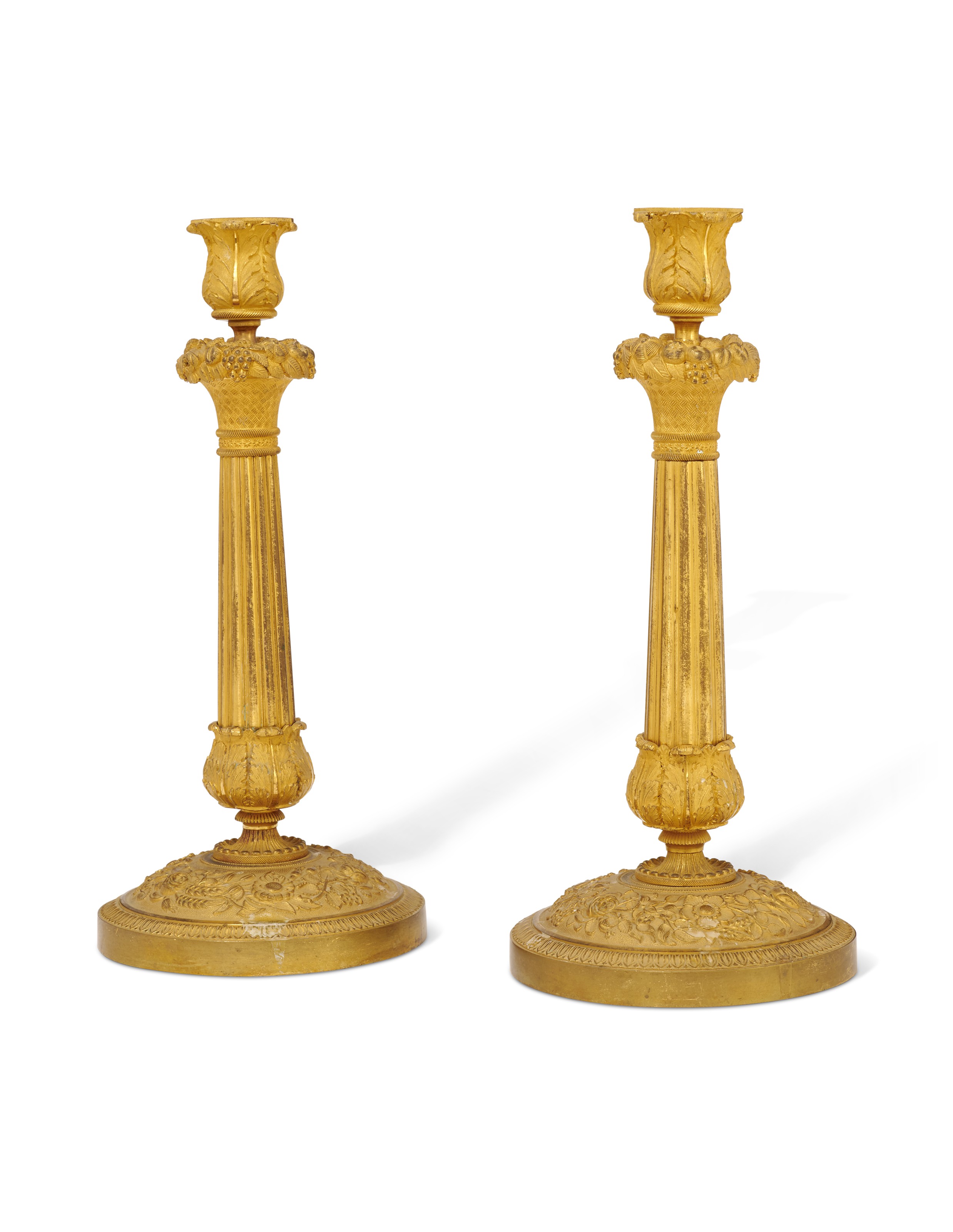 A PAIR OF LOUIS-PHILIPPE ORMOLU CANDLESTICKS, CIRCA 1830-40 | Christie’s