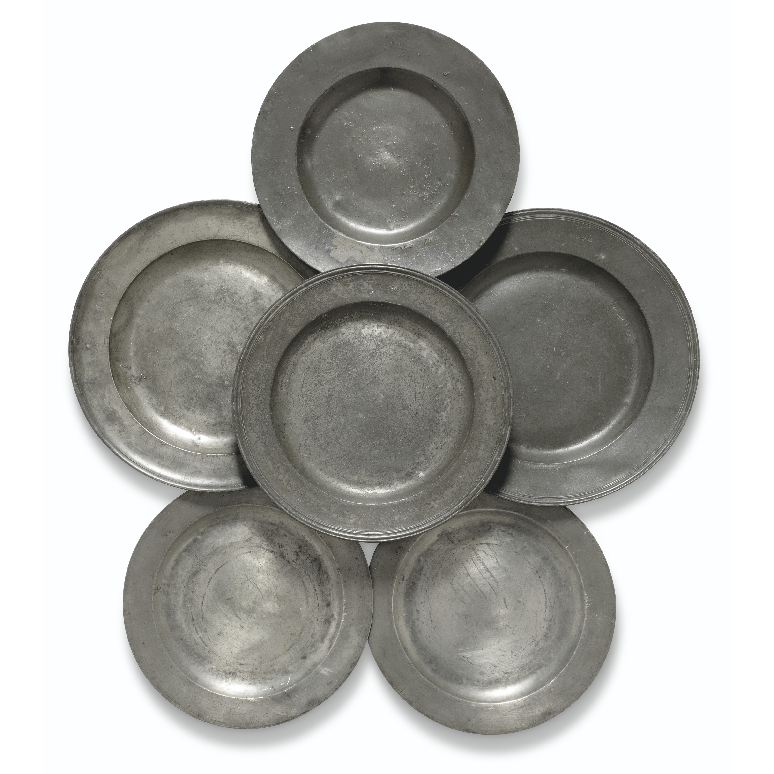 SIX GEORGIAN PEWTER PLATTERS, 18TH CENTURY | Christie’s