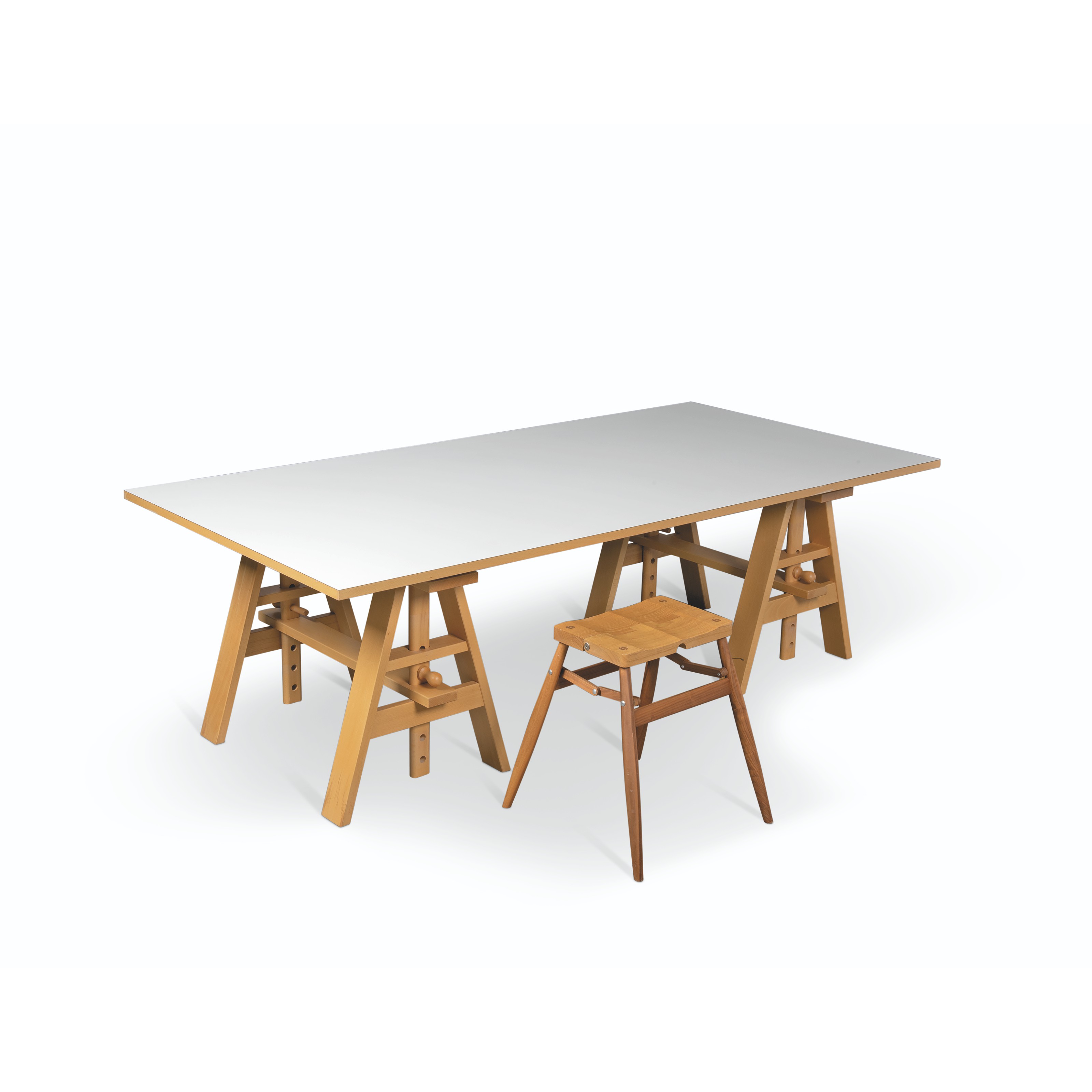 A BEECH AND WHITE LAMINATE 'LEONARDO' WRITING-TABLE, AFTER THE 1969 ...