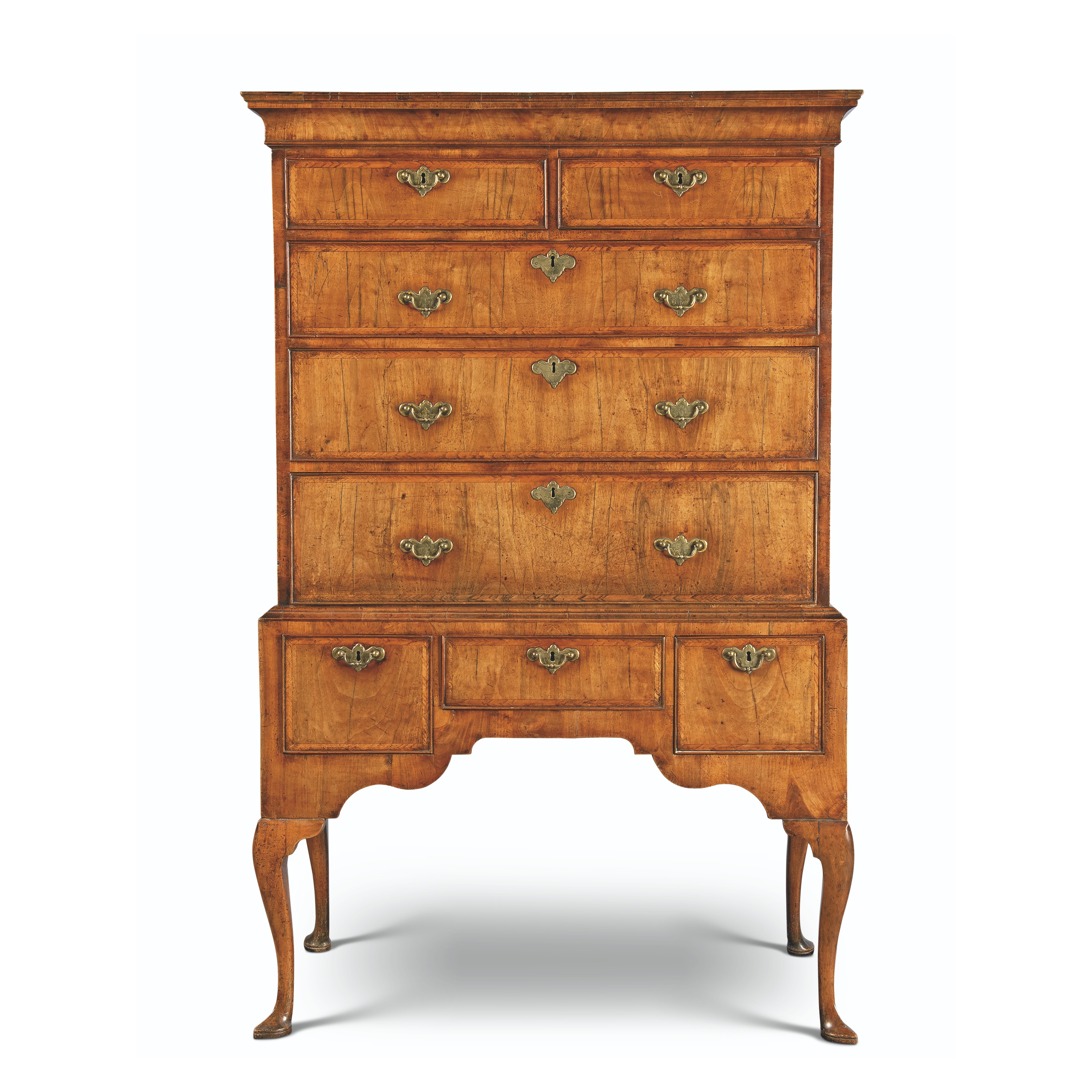 A GEORGE I WALNUT AND FEATHER-BANDED CHEST-ON-STAND, EARLY 18TH CENTURY ...