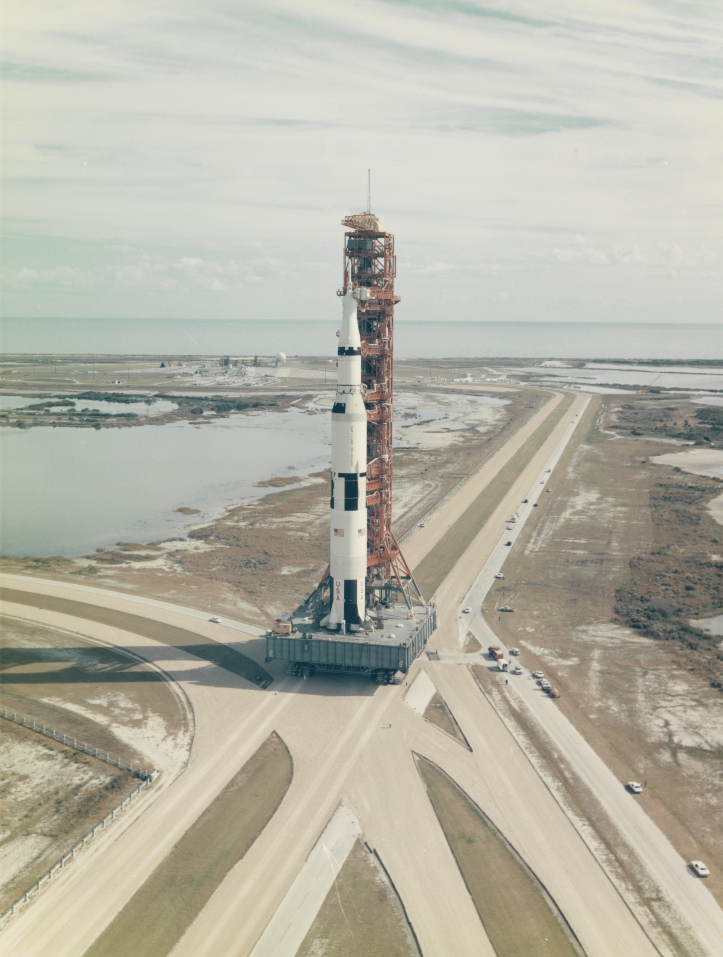 Rollout of Saturn V rocket (Apollo 14); crew portrait of Apollo 14 ...