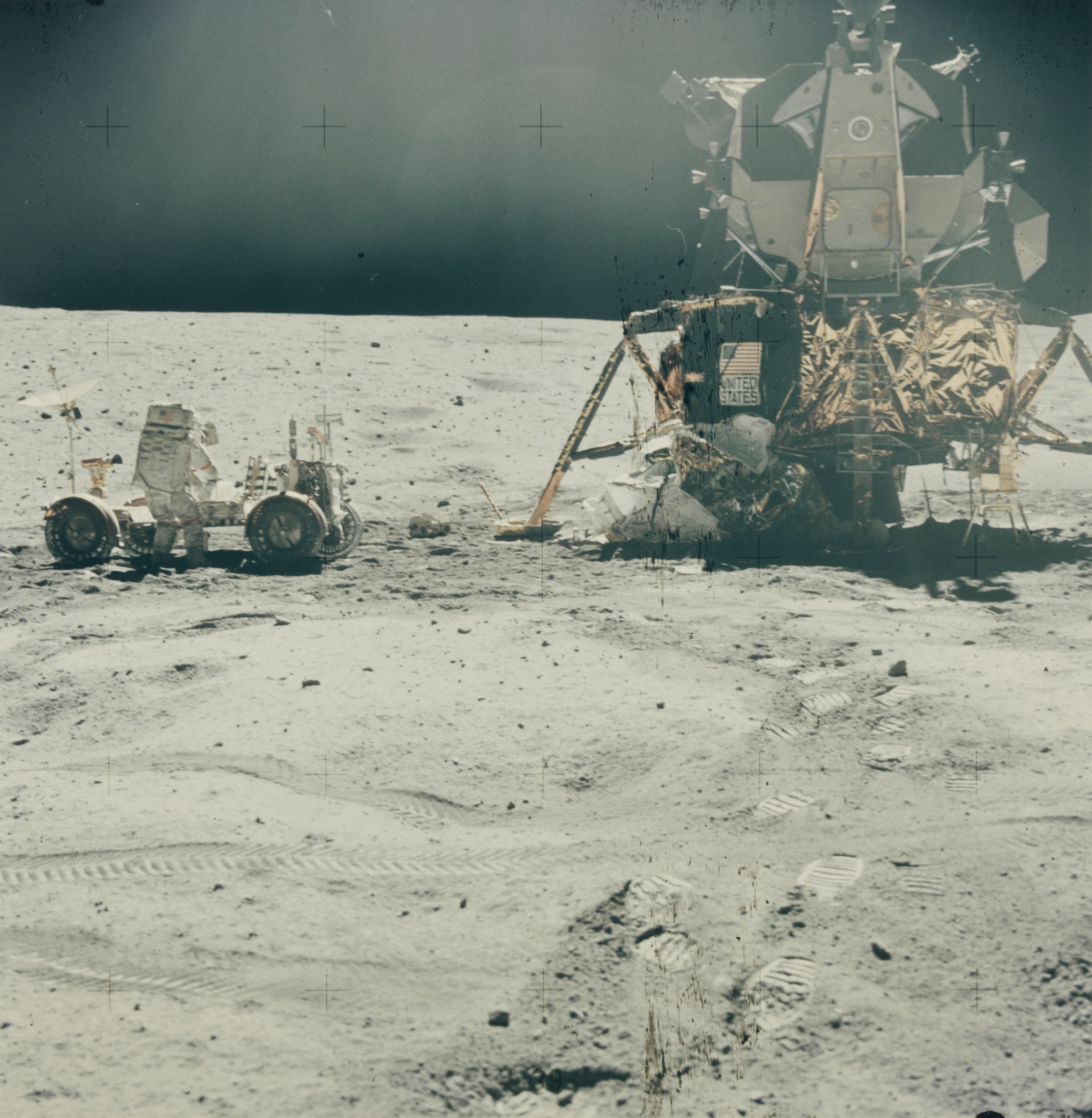 Experiments on the Moon: astronaut John Young beside the lunar rover ...