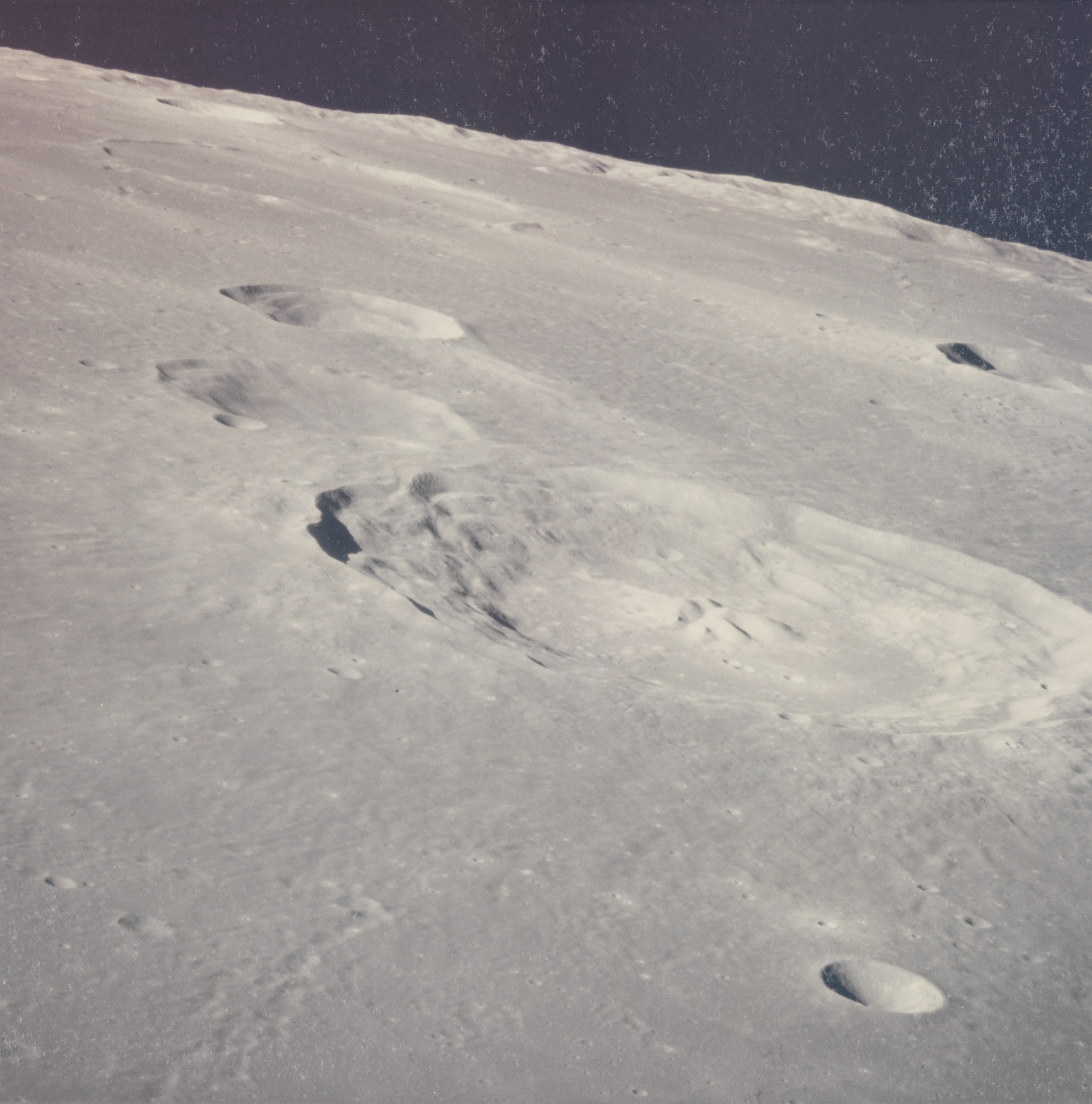 Moonscapes: Three views of mountains and craters on the lunar surface ...