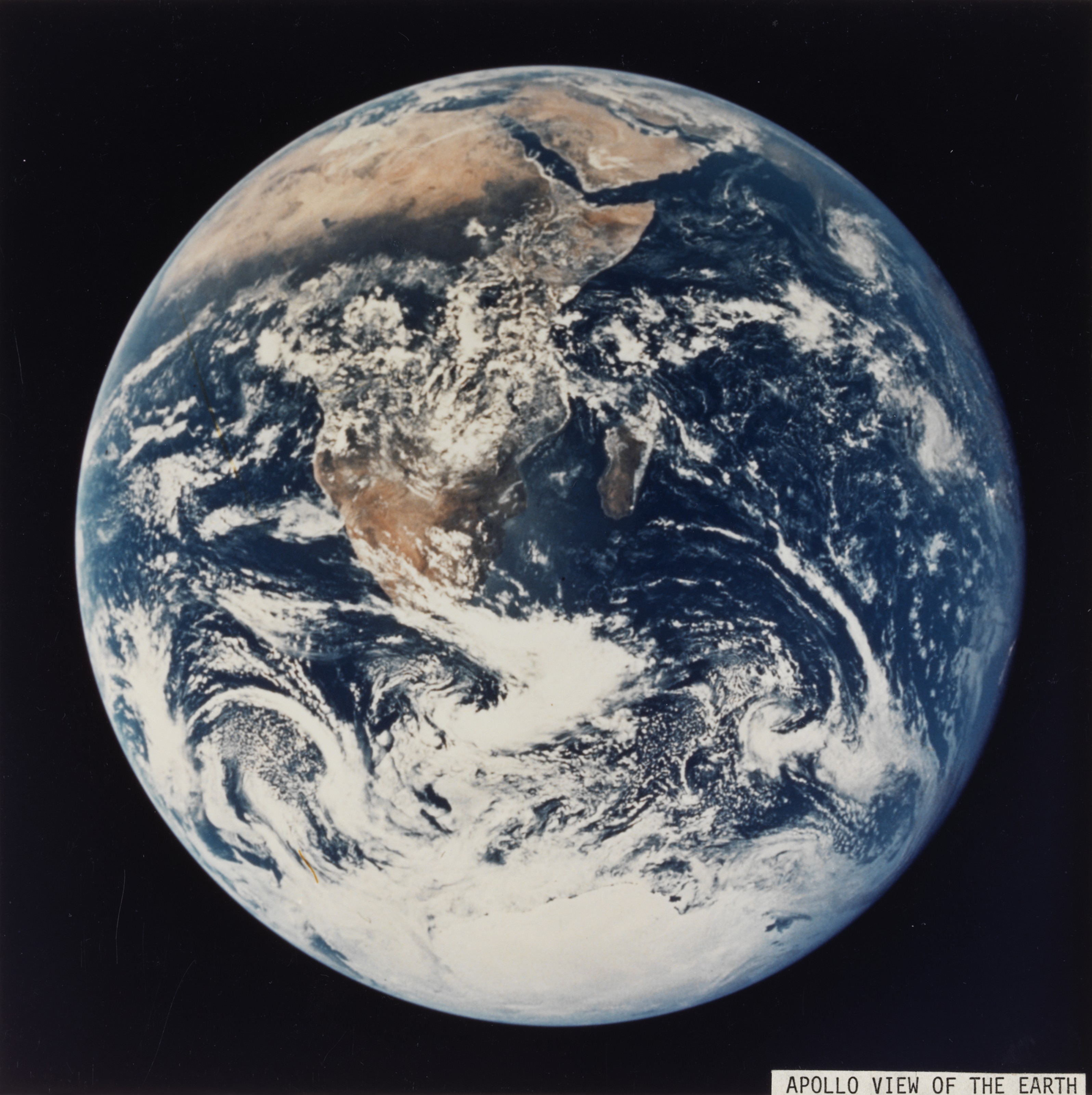 Two versions of the “Blue Marble”, the first photograph of the full ...
