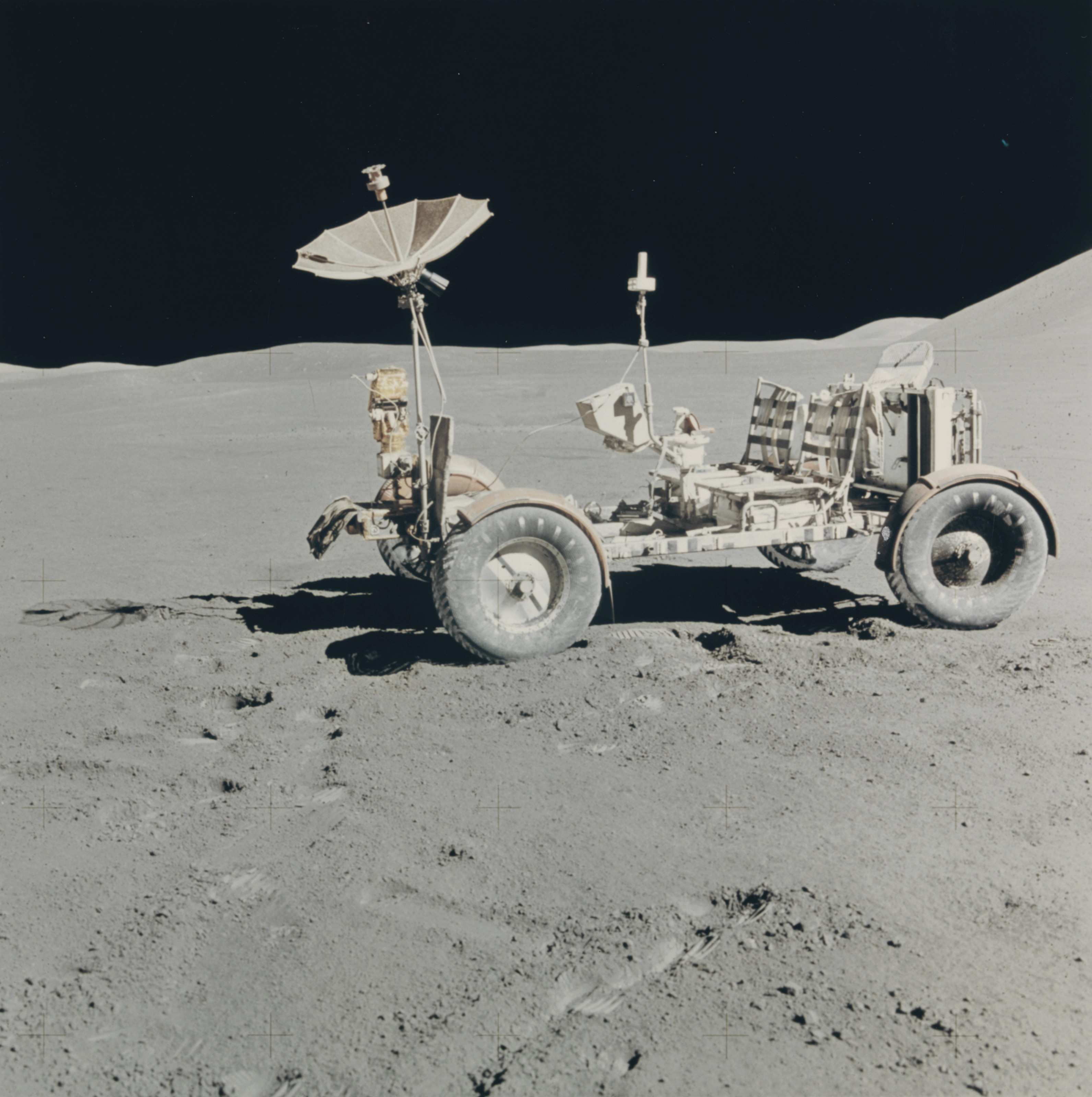 A miscellany of NASA photographs, including the Apollo 15 lunar rover ...