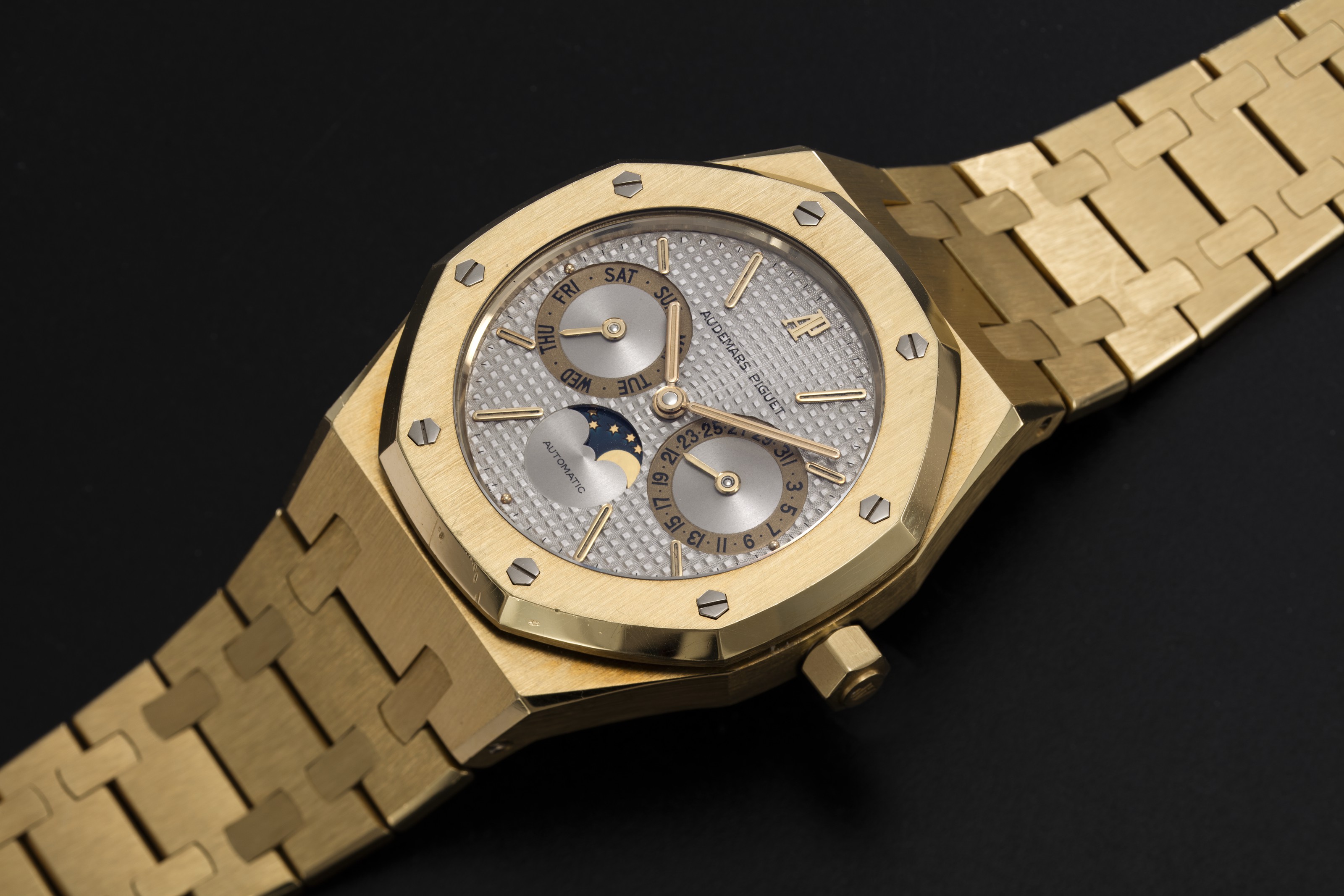 AUDEMARS PIGUET, A GOLD ROYAL OAK DAY-DATE WITH MOON-PHASE, REF ...