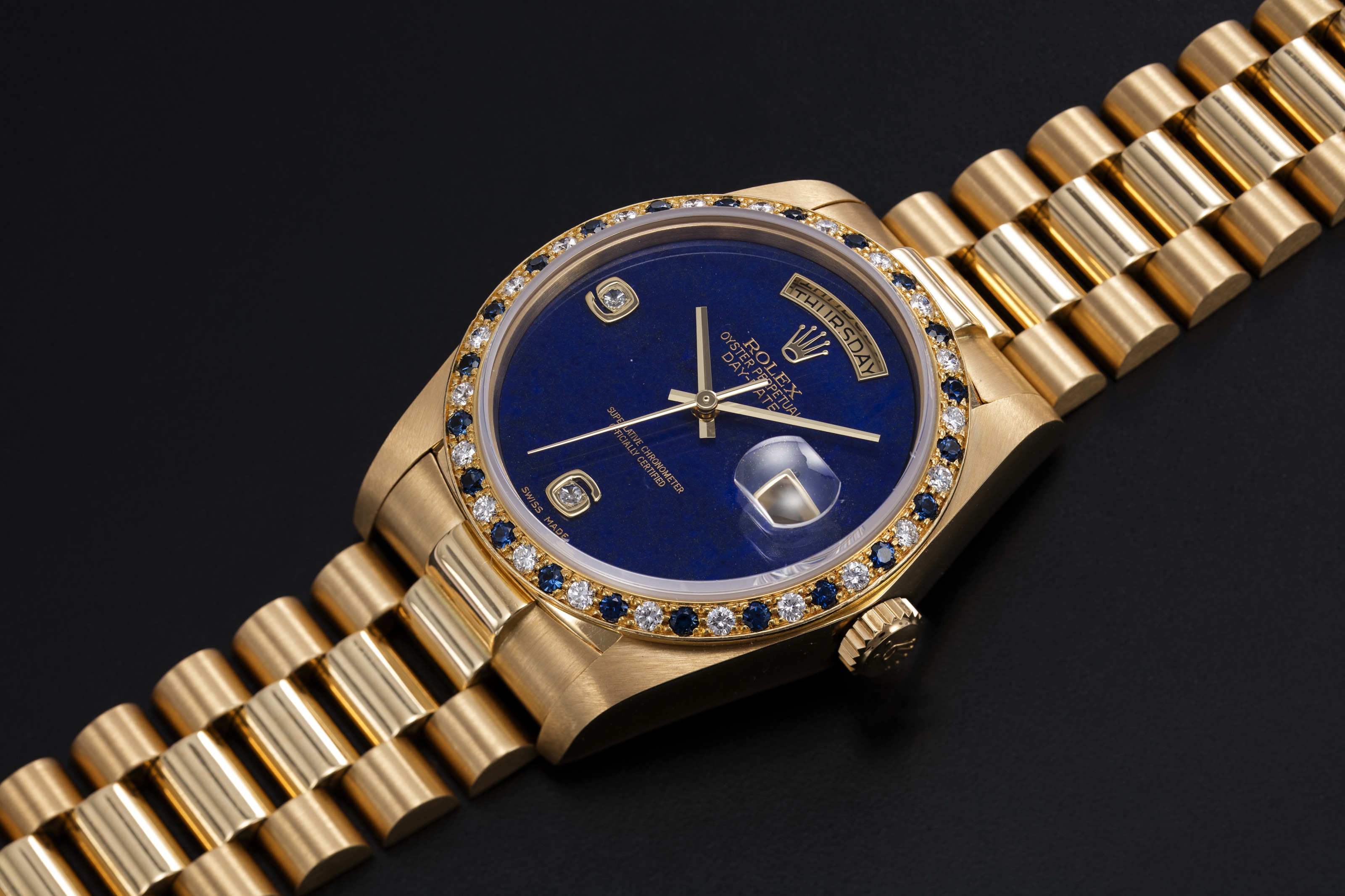 ROLEX, A GOLD OYSTER PERPETUAL DAY-DATE WITH SAPPHIRE AND DIAMOND ...