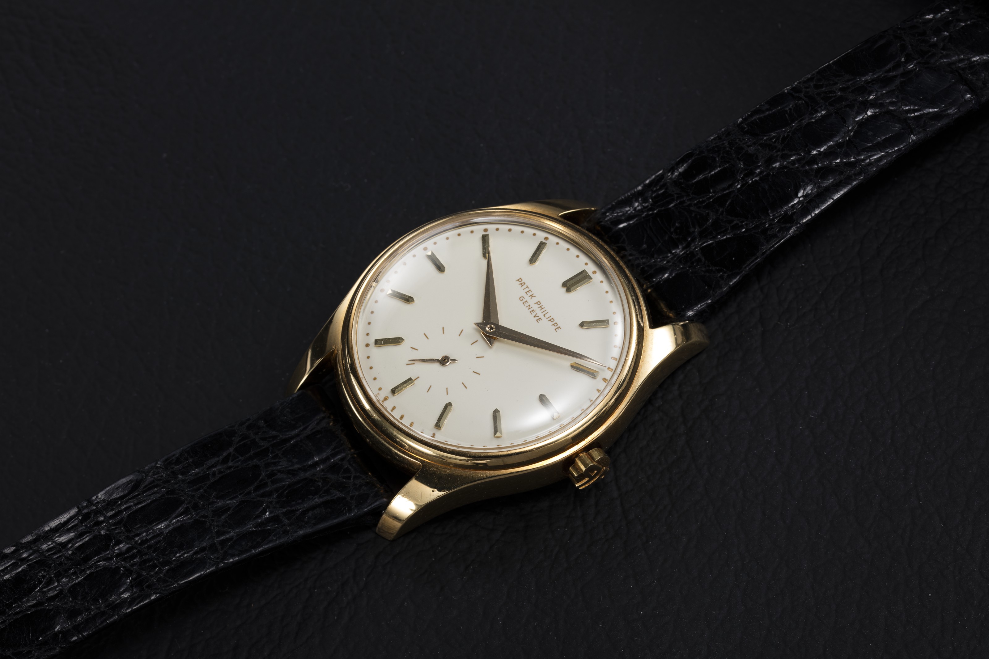PATEK PHILIPPE, A GOLD SELF-WINDING WRISTWATCH WITH ENAMEL DIAL, REF ...