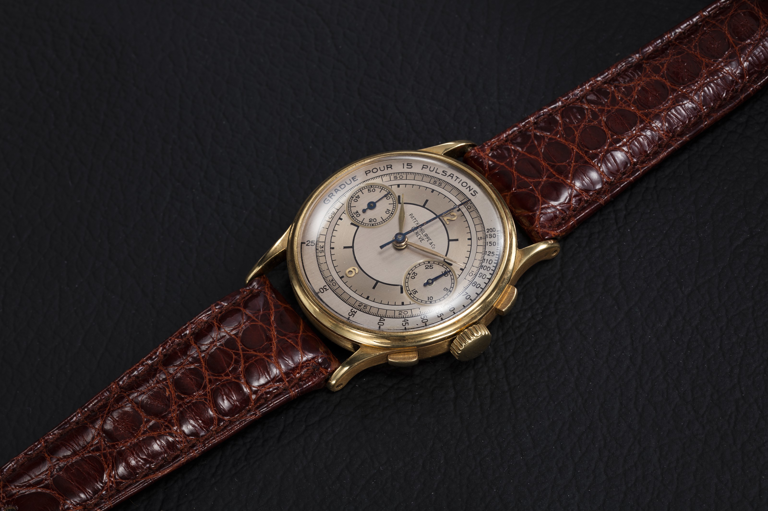 PATEK PHILIPPE, REF. 130, A GOLD RESTORED CHRONOGRAPH WITH PULSOMETER ...