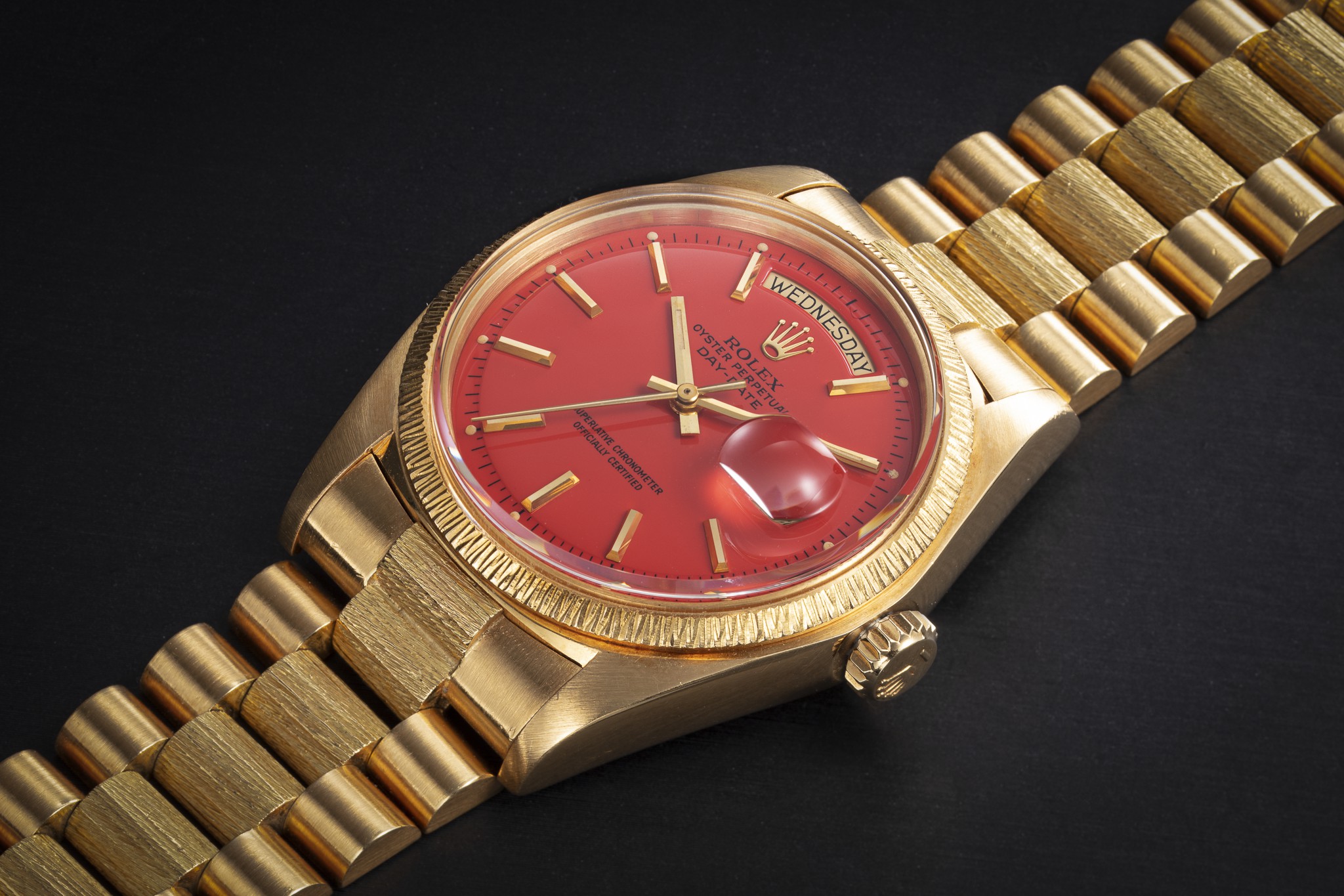 ROLEX, DAY-DATE REF. 1807, A GOLD AUTOMATIC WRISTWATCH WITH CORAL ...