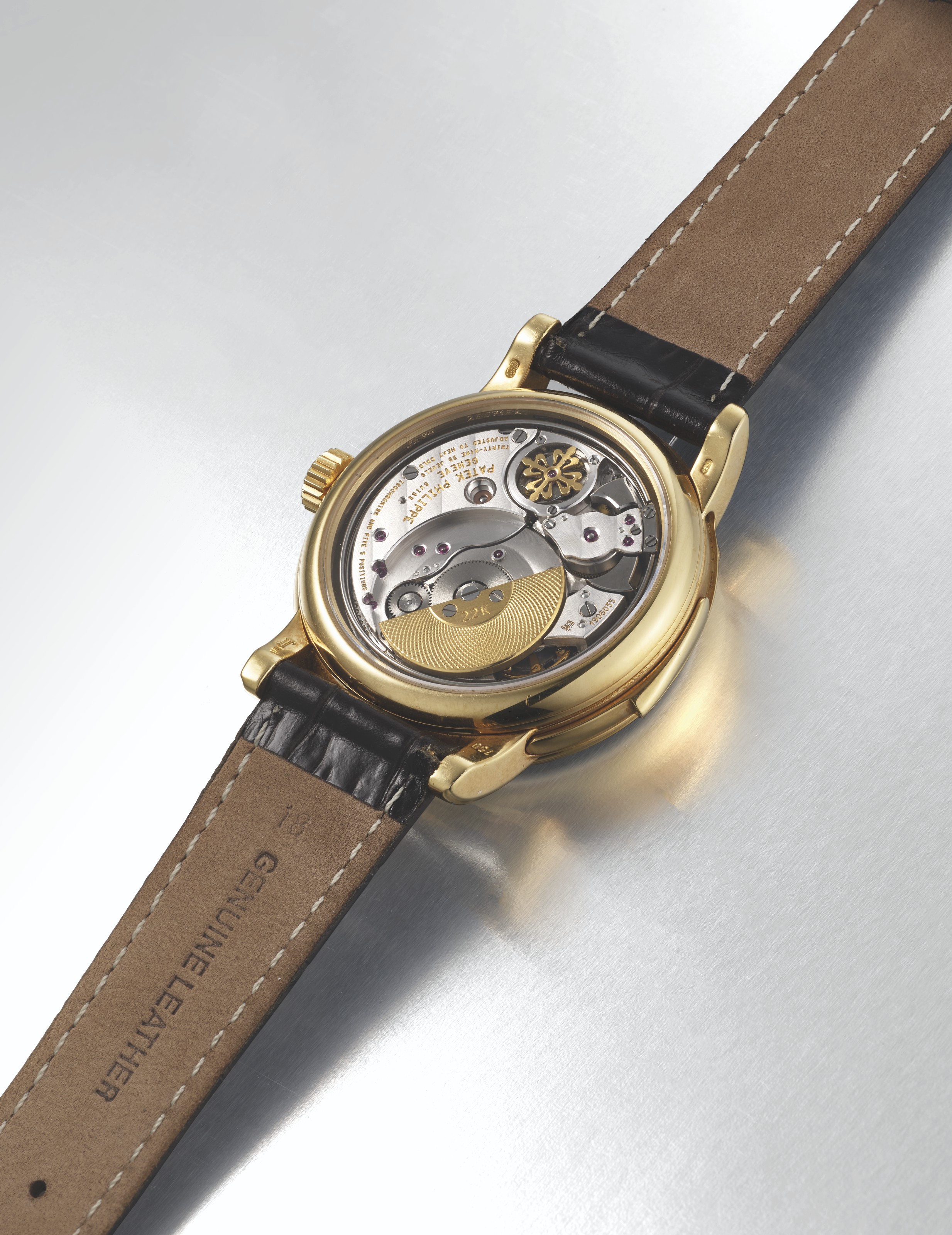 PATEK PHILIPPE. AN EXTREMELY RARE 18K GOLD AUTOMATIC MINUTE REPEATING ...