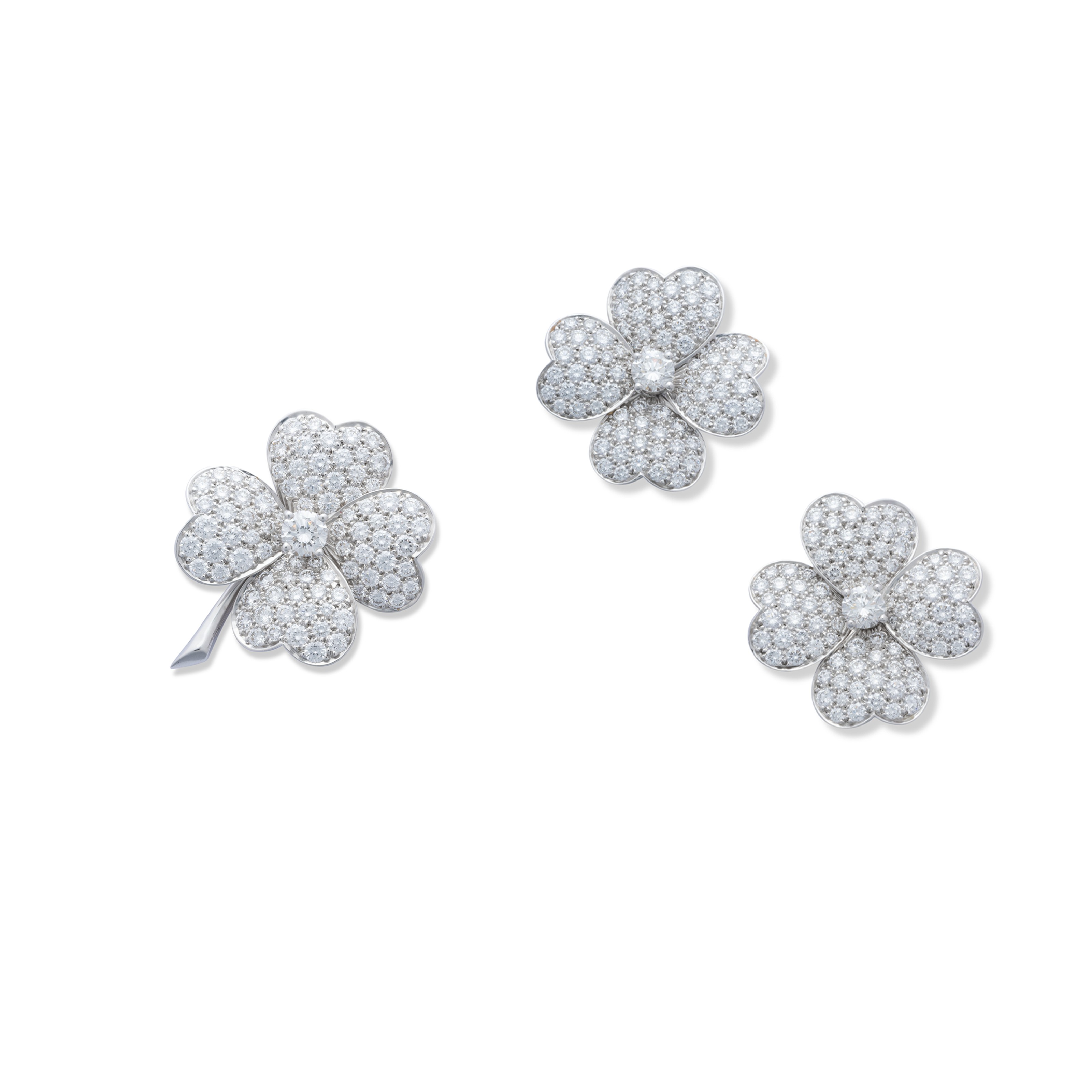 VAN CLEEF & ARPELS DIAMOND 'COSMOS' EARRING AND BROOCH SET, | Christie’s