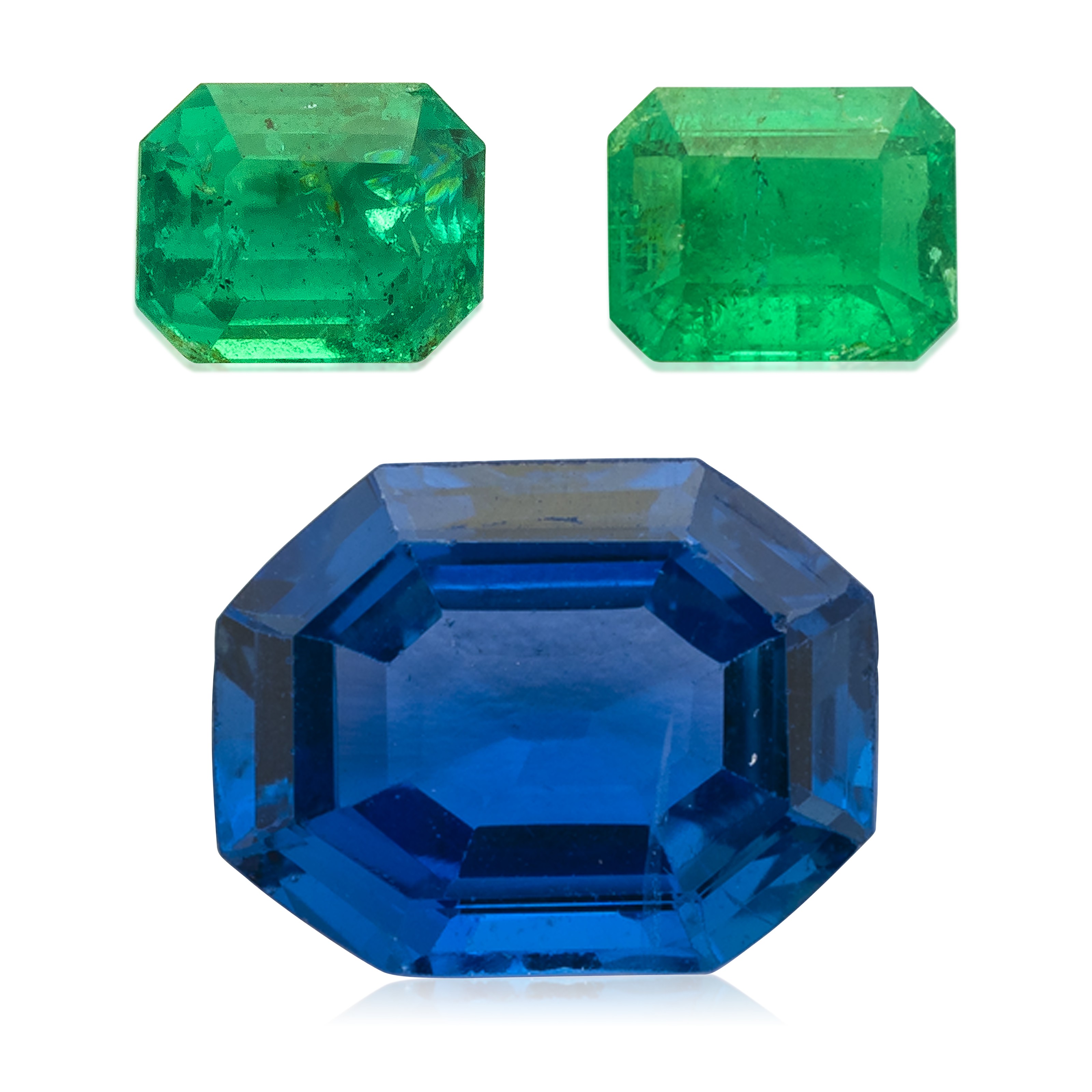 UNMOUNTED SAPPHIRE AND TWO UNMOUNTED EMERALDS, | Christie’s