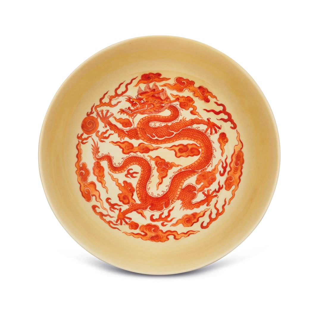 A FINE AND RARE IRON-RED DECORATED CAFÉ-AU-LAIT GROUND ‘DRAGON’ DISH ...