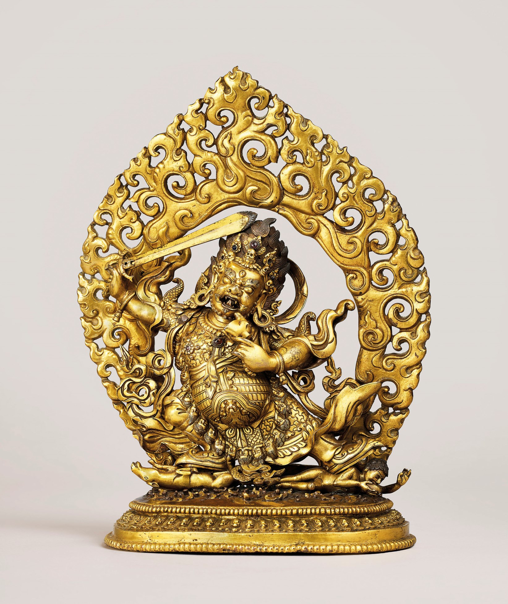 A GILT-BRONZE FIGURE OF BEGTSE CHEN, QIANLONG PERIOD (1736-1795 ...