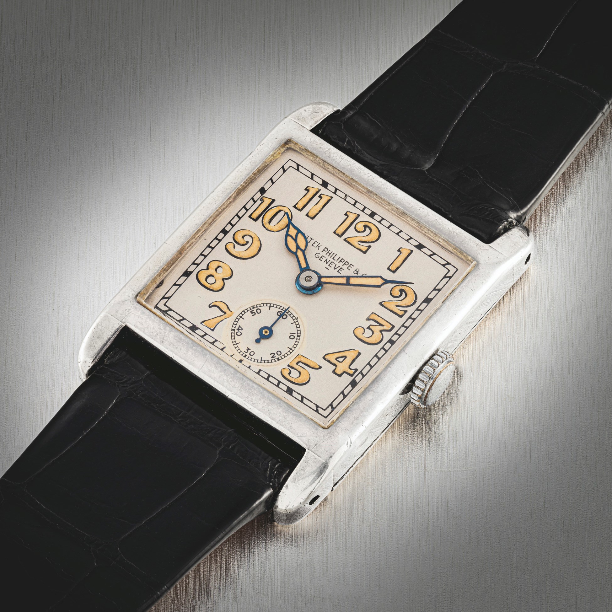 PATEK PHILIPPE. AN EXTREMELY RARE SILVER SQUARE WRISTWATCH WITH ...
