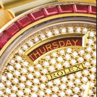 ROLEX. AN EXTREMELY RARE 18K GOLD, DIAMOND AND RUBY-SET AUTOMATIC ...