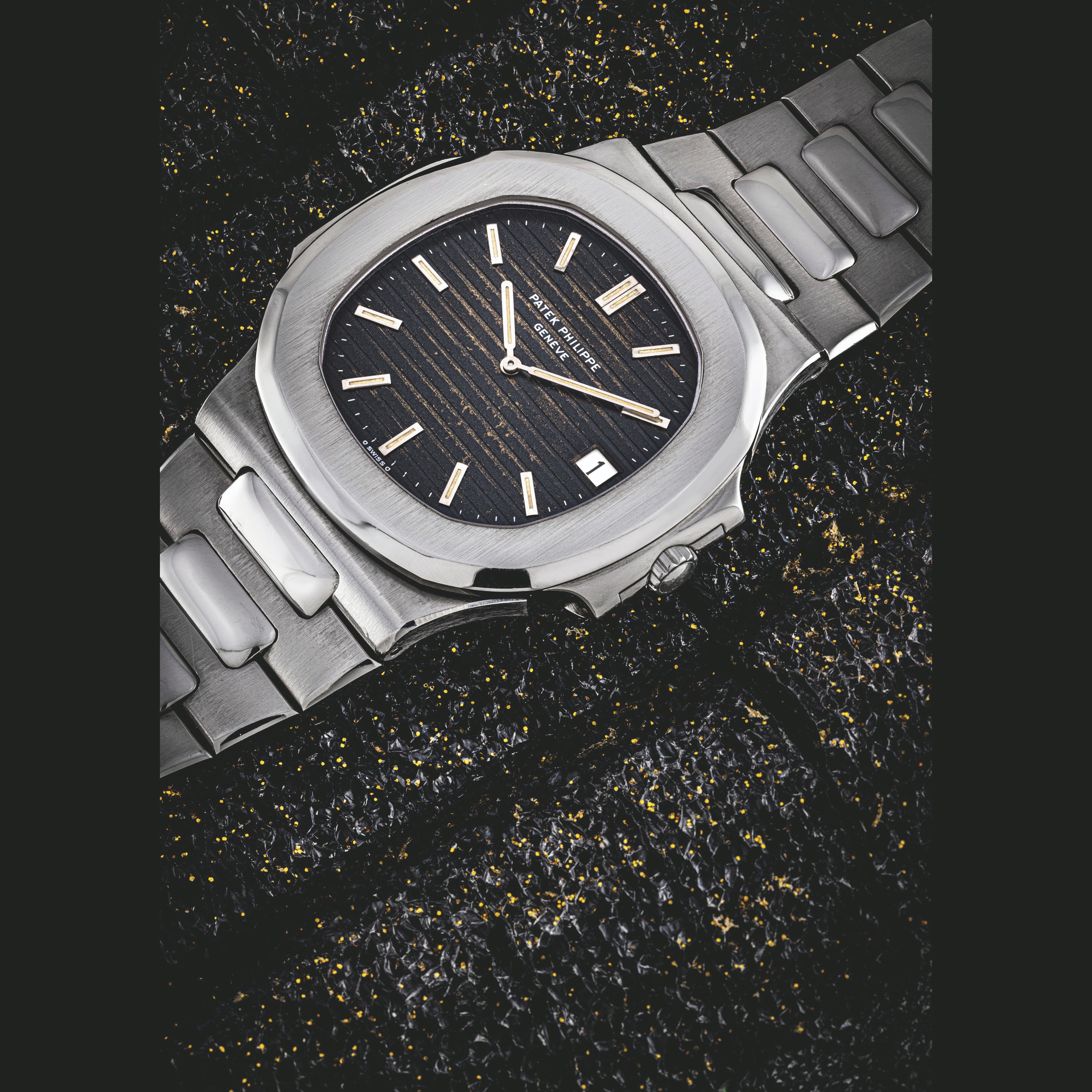 PATEK PHILIPPE. AN 18K GOLD, DIAMOND AND EMERALD-SET AUTOMATIC ...