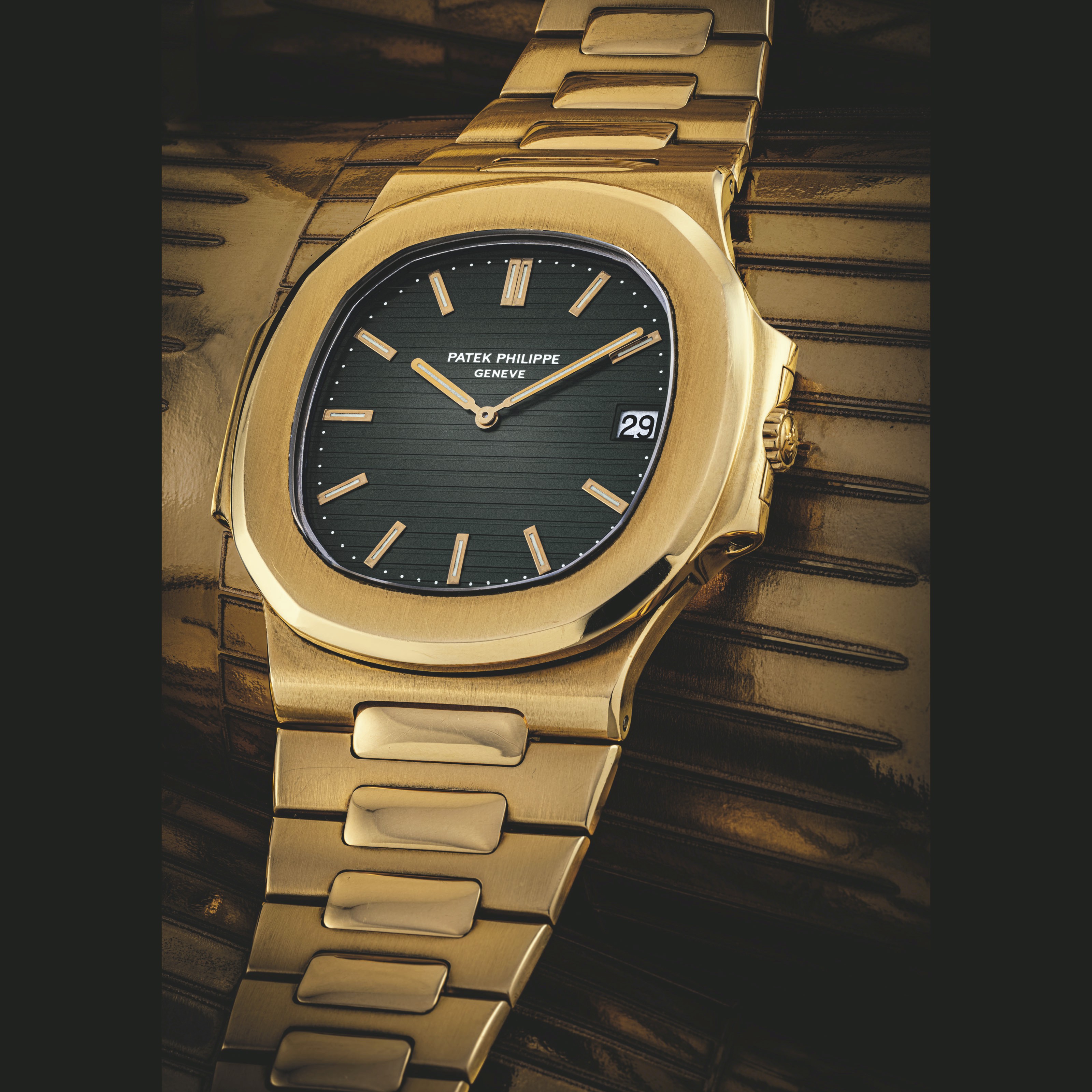 PATEK PHILIPPE. A STAINLESS STEEL AUTOMATIC WRISTWATCH WITH DATE AND ...