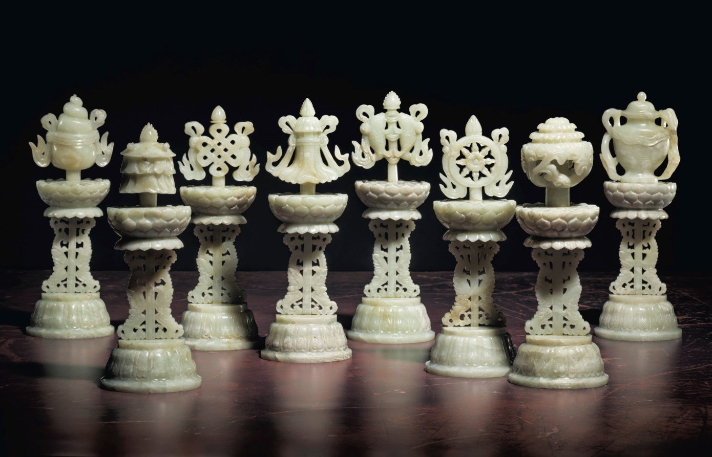 AN EXCEPTIONALLY RARE COMPLETE SET OF PALE GREENISH-WHITE JADE EIGHT ...