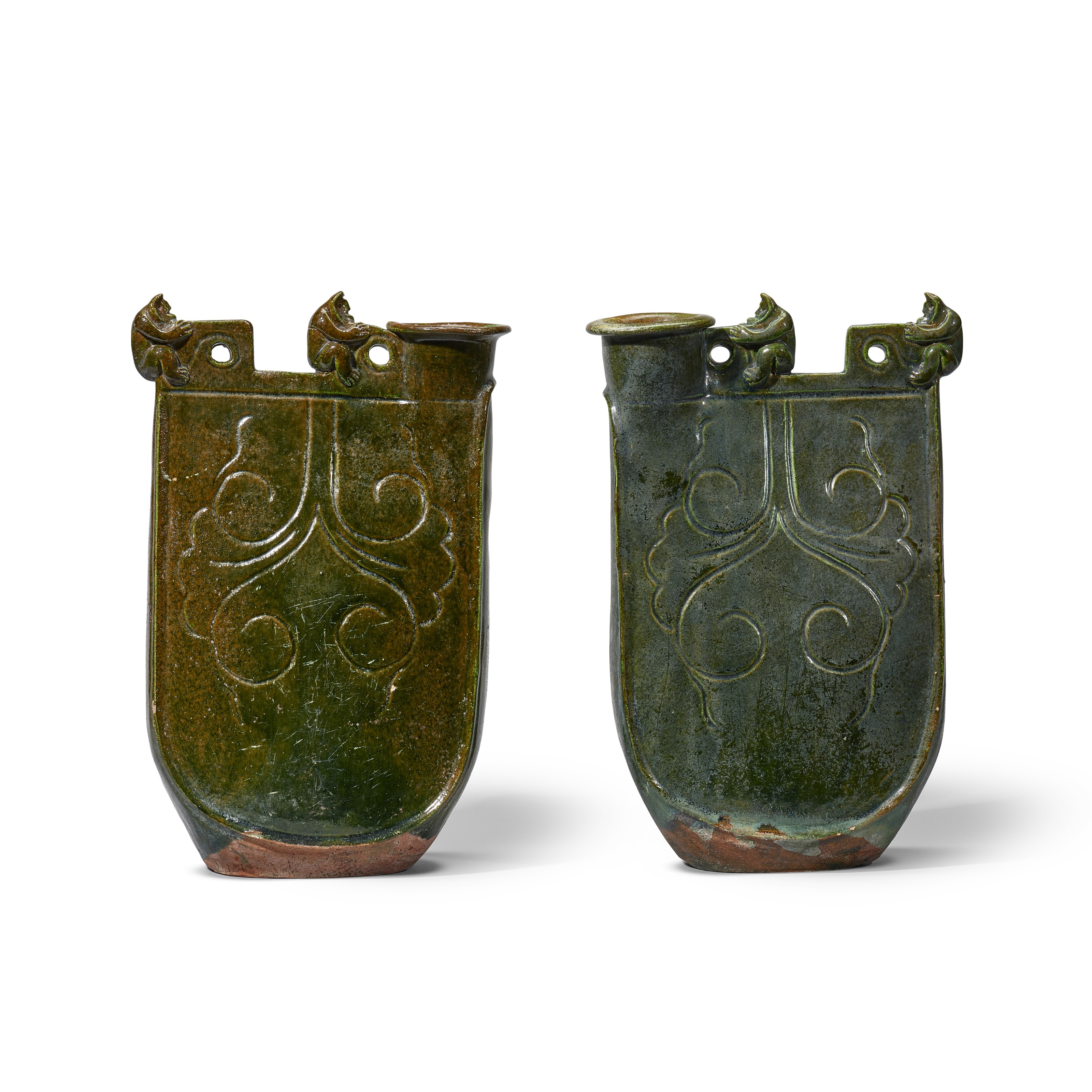 A PAIR OF GREEN-GLAZED POTTERY FLASKS, LIAO DYNASTY (907-1125) | Christie’s